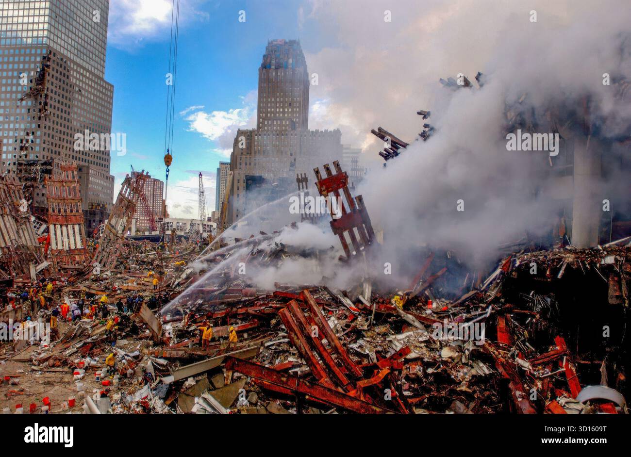 Fires still burn amidst the rubble and debris of the World Trade ...