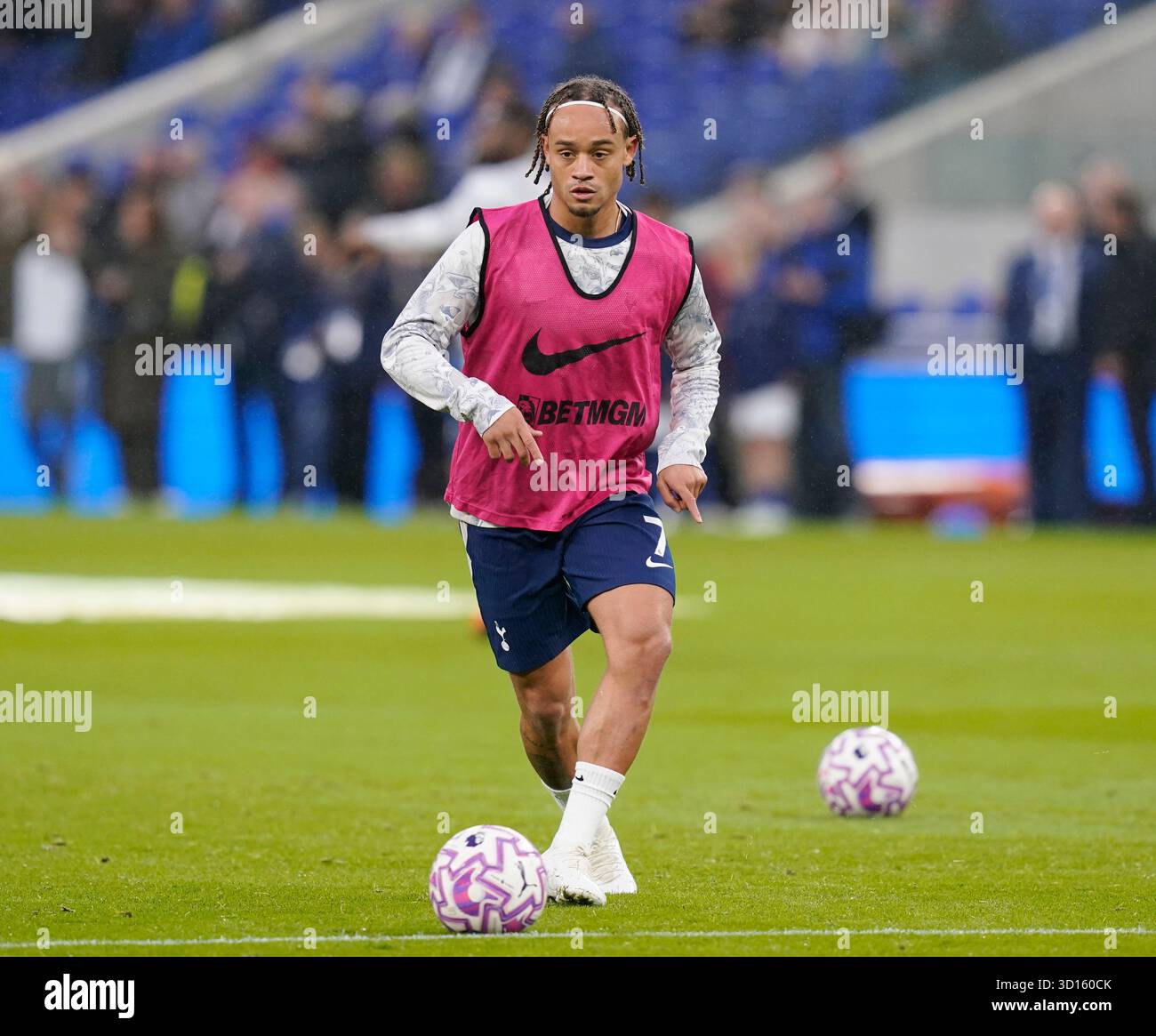 Liverpool, England, 26th October 2025. Xavi Simons of Tottenham warms ...