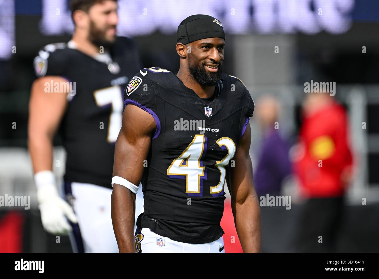 Baltimore Ravens running back Justice Hill (43) looks on during pre ...