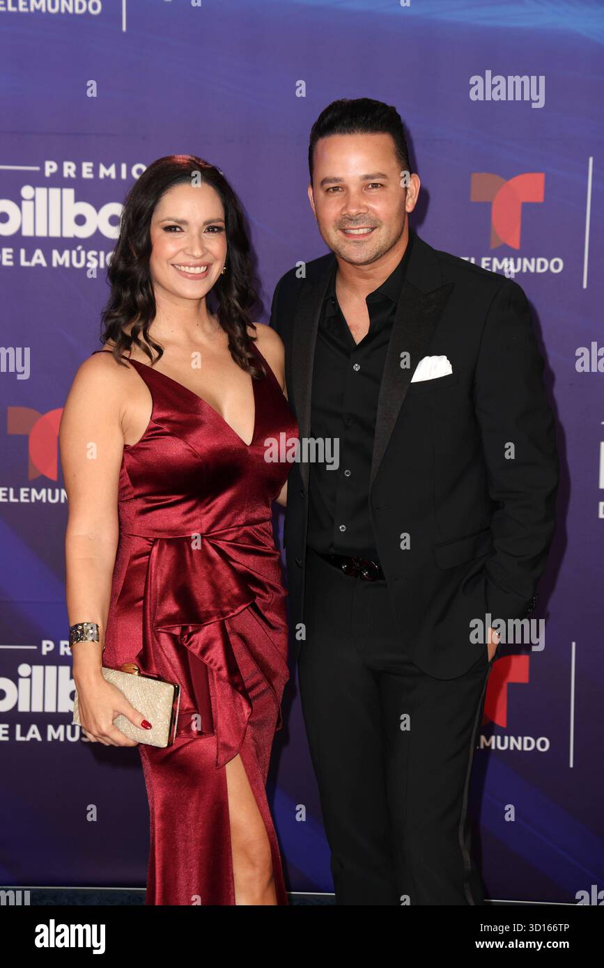 MIAMI, FLORIDA - OCTOBER 23: Johanna Cruz and Carlos Robles attend the ...