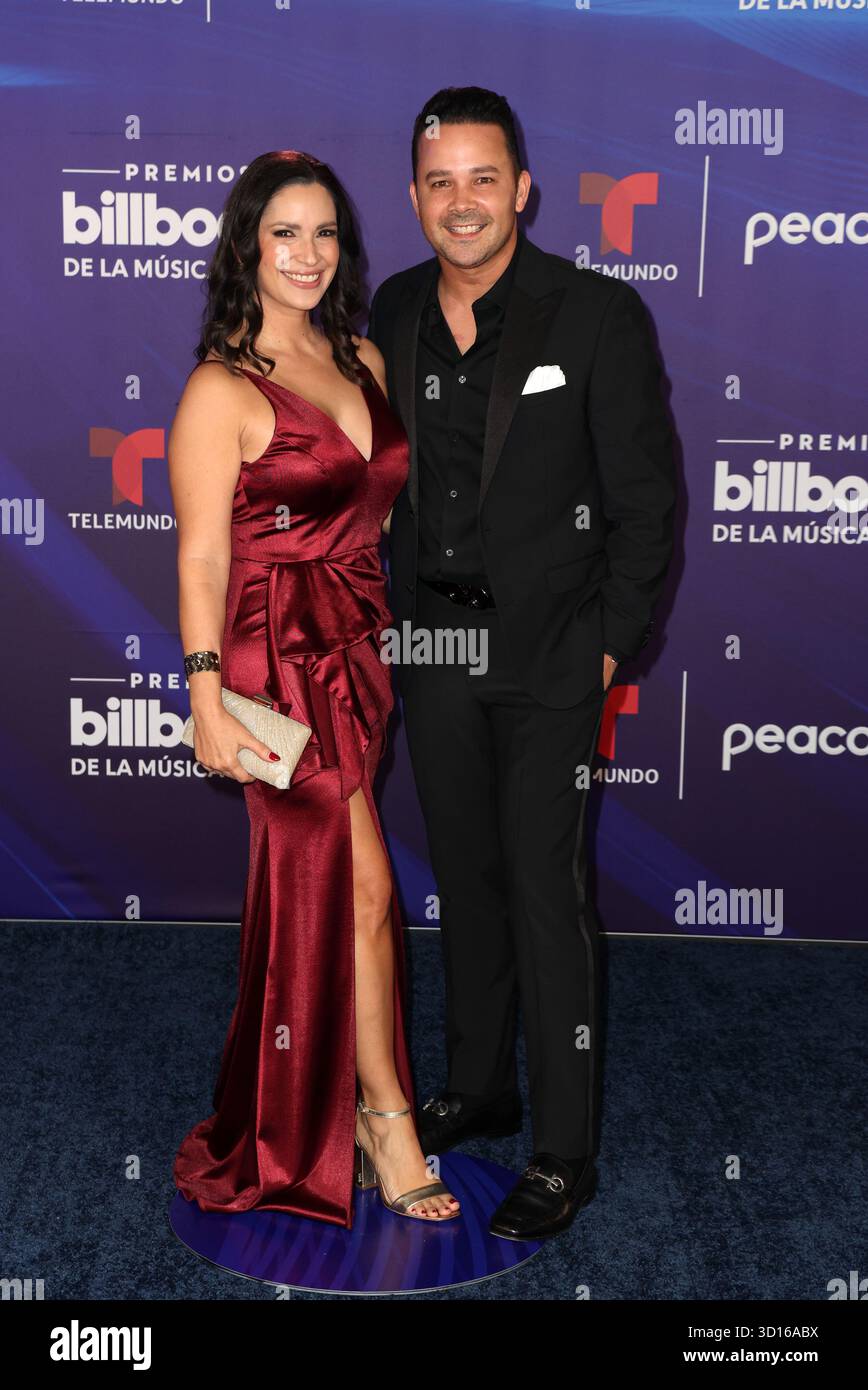 MIAMI, FLORIDA - OCTOBER 23: Johanna Cruz and Carlos Robles attend the ...