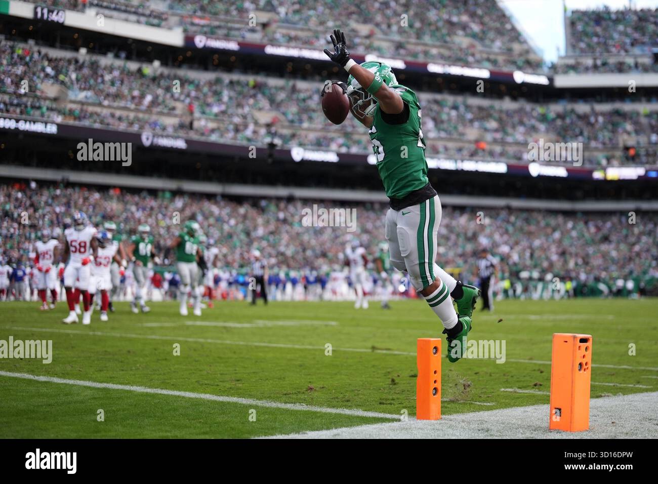 Philadelphia Eagles running back Saquon Barkley scores a touchdown during the first half of an ...