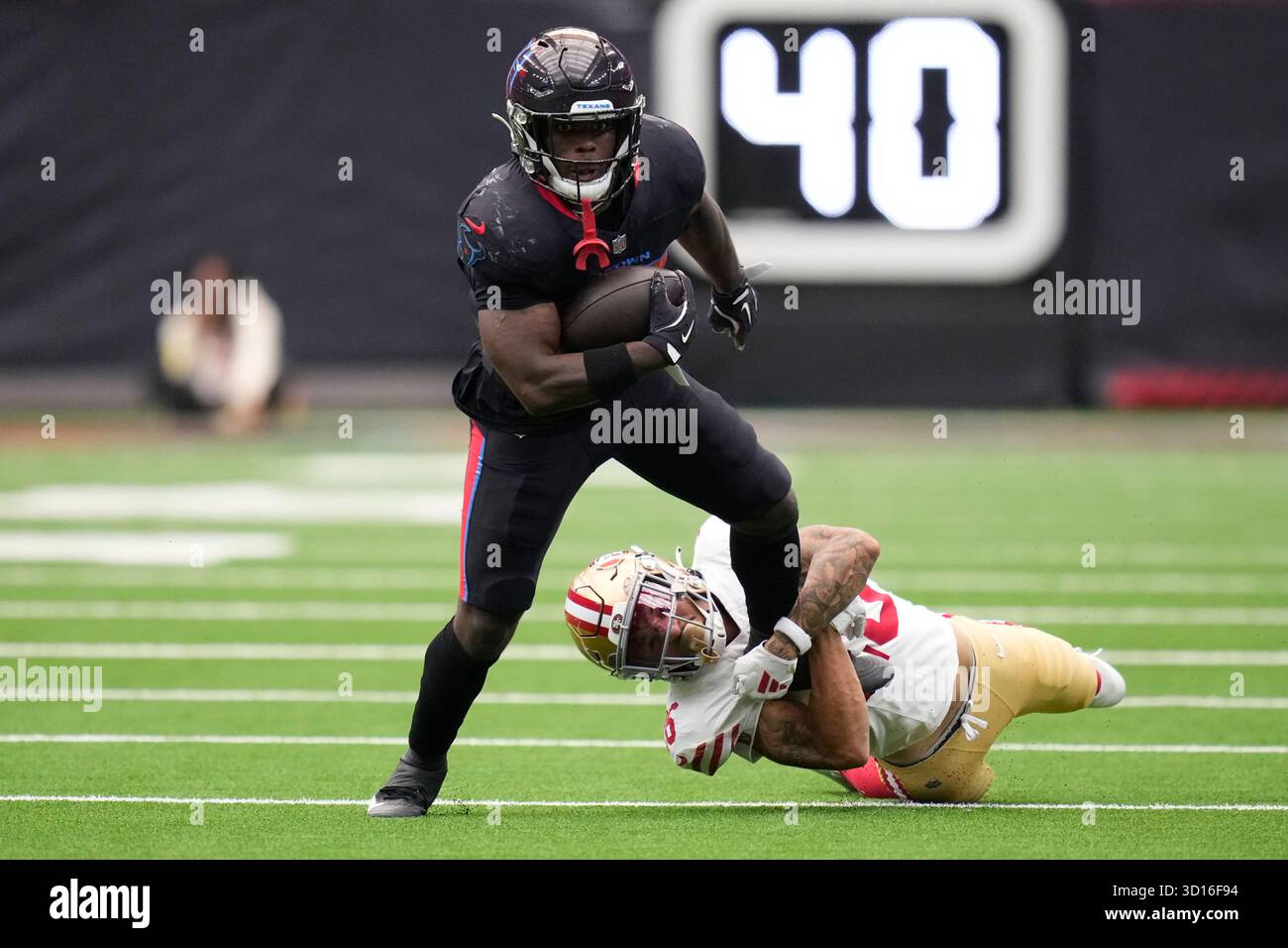 Houston Texans running back Woody Marks runs with the ball as San ...