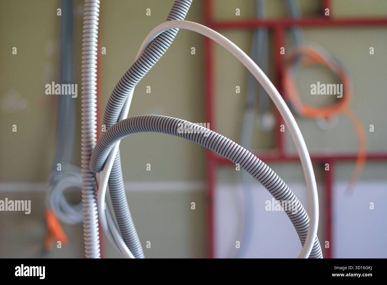 Flexible electrical conduits in an indoor renovation site Stock Photo ...
