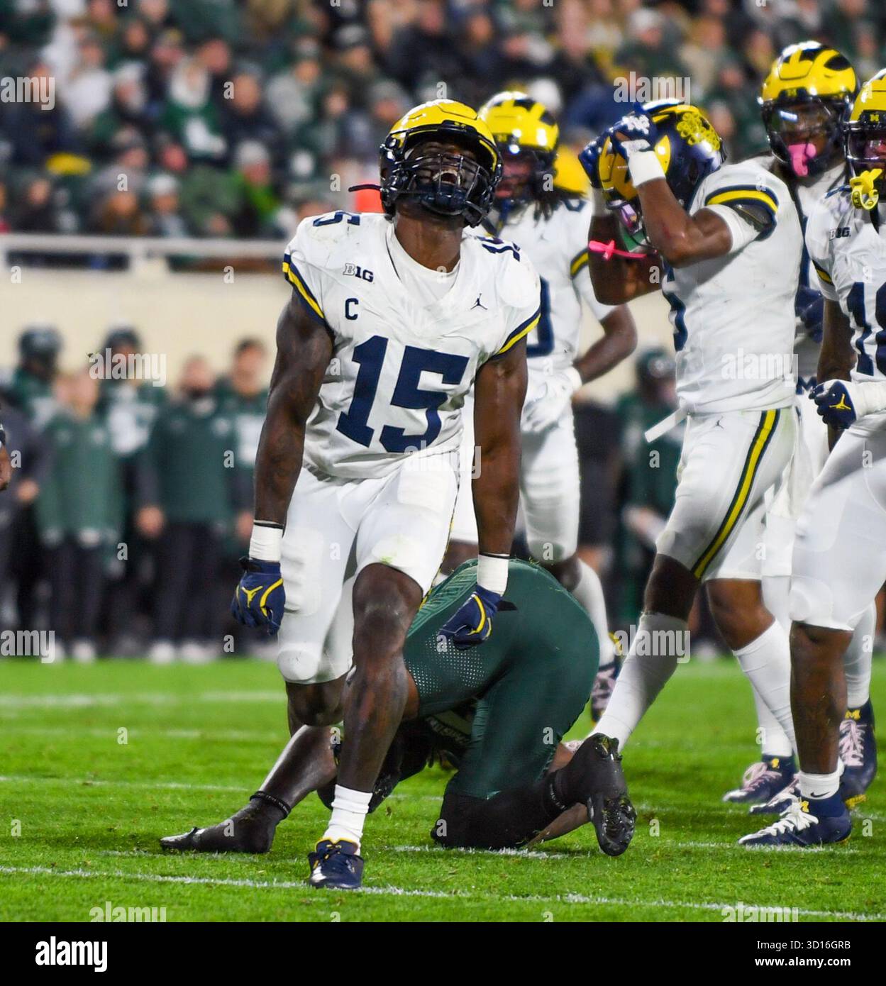 October 25, 2025: Michigan linebacker Ernest Hausmann (15) celebrates ...