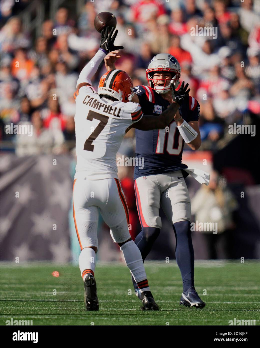 New England Patriots quarterback Drake Maye (10) passes over the reach ...