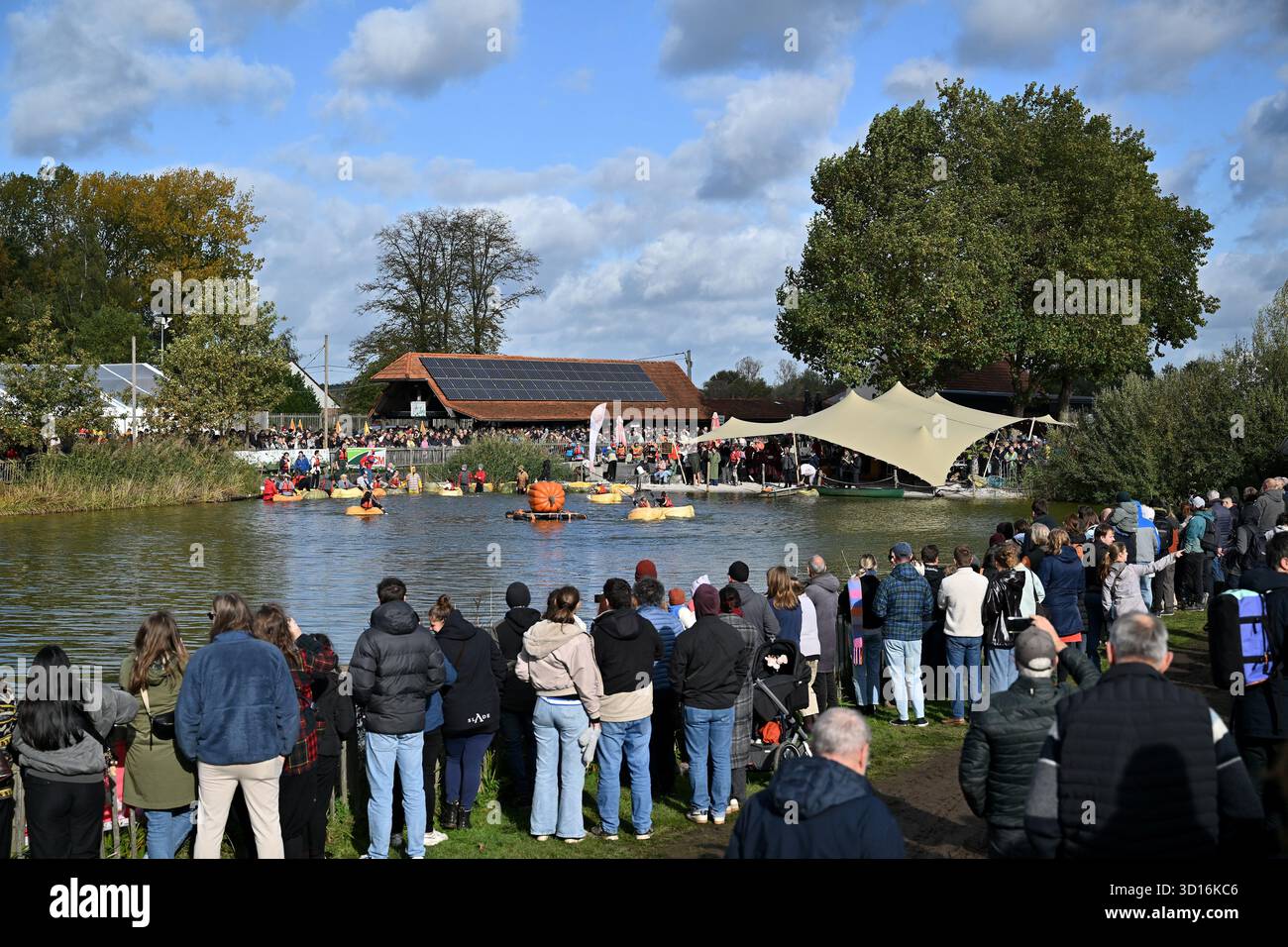 Various activities at the 'Pompoenregatta' boat race in scooped out ...
