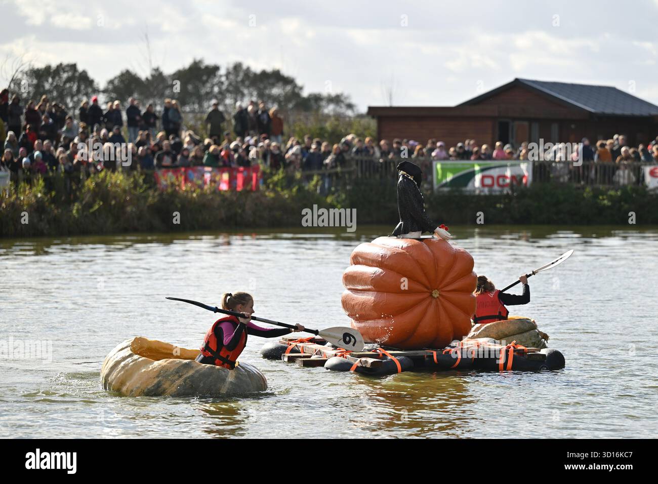 Various activities at the 'Pompoenregatta' boat race in scooped out ...