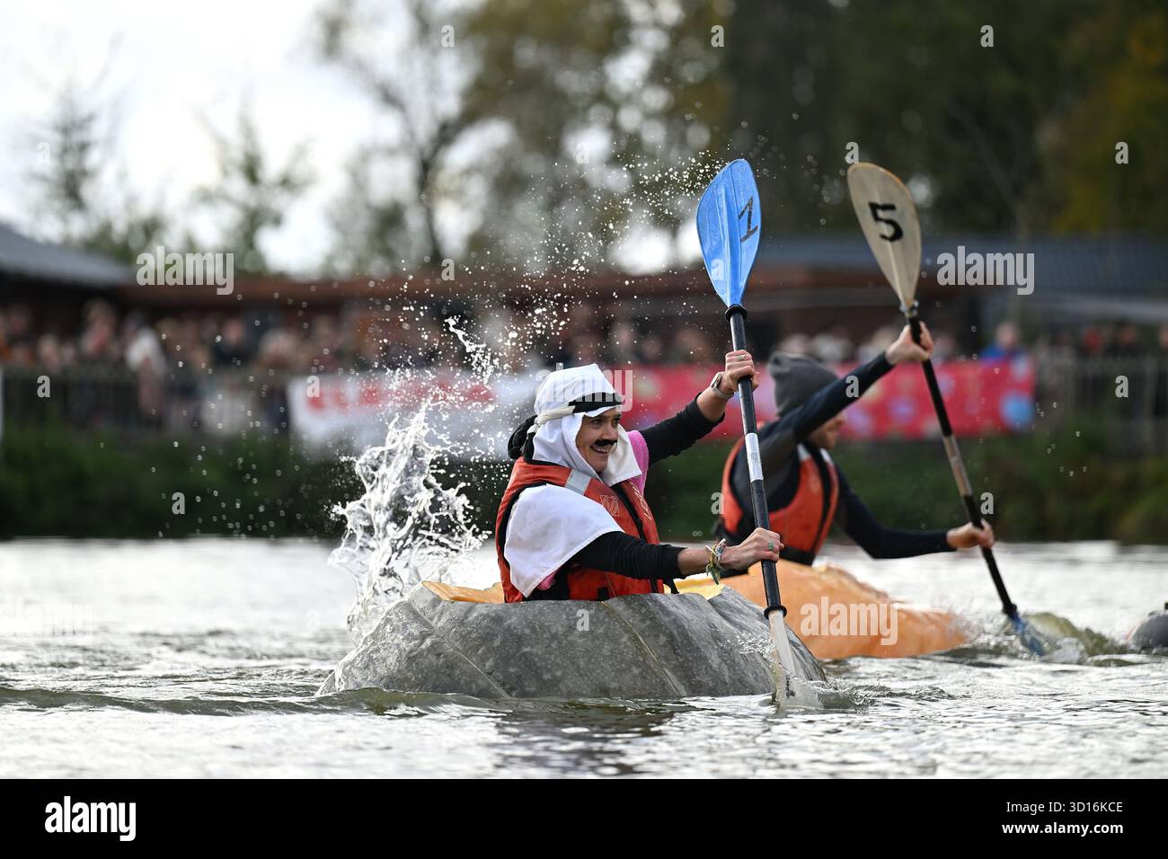 Various activities at the 'Pompoenregatta' boat race in scooped out ...