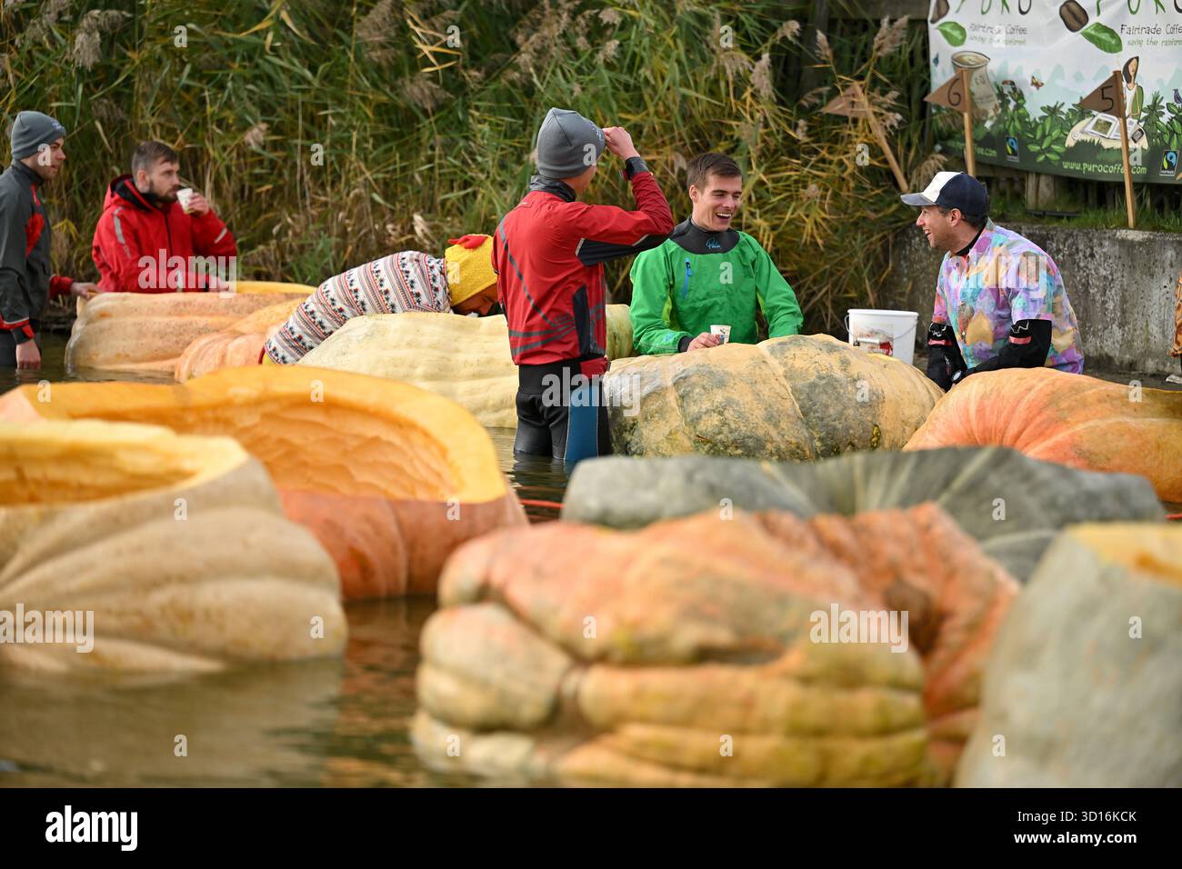 Various activities at the 'Pompoenregatta' boat race in scooped out ...