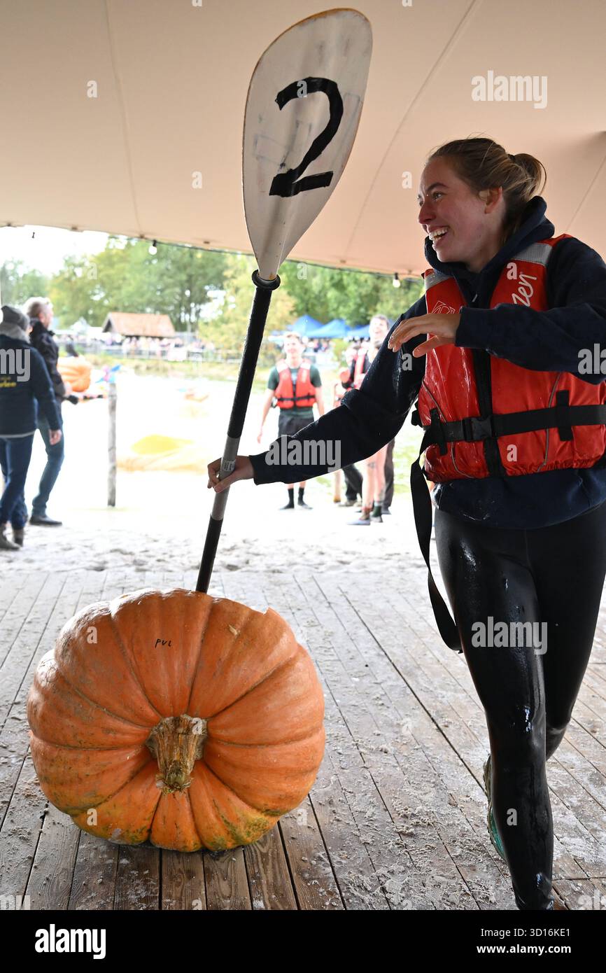 Various activities at the 'Pompoenregatta' boat race in scooped out ...