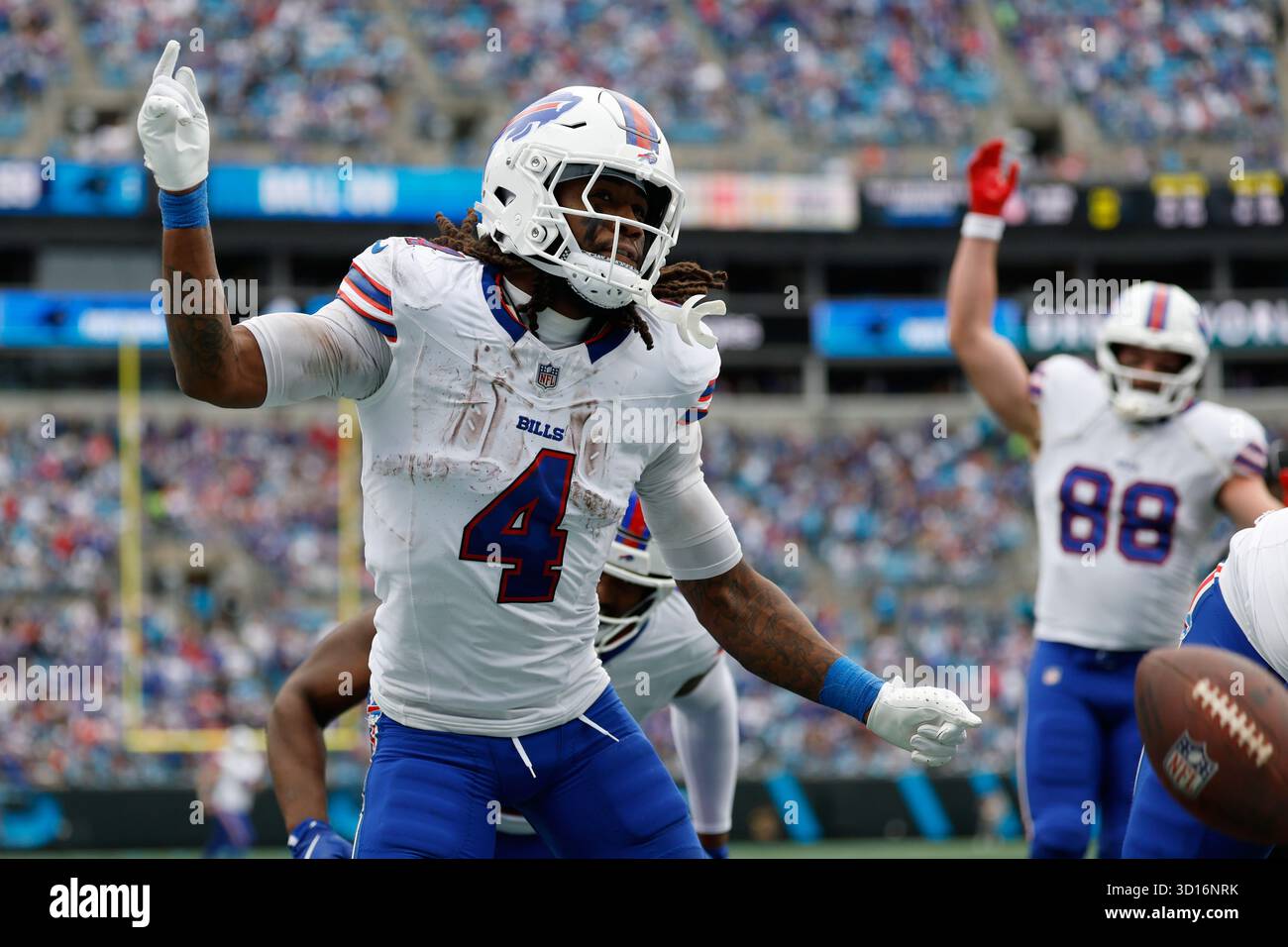 Buffalo Bills running back James Cook III (4) celebrates after scoring ...