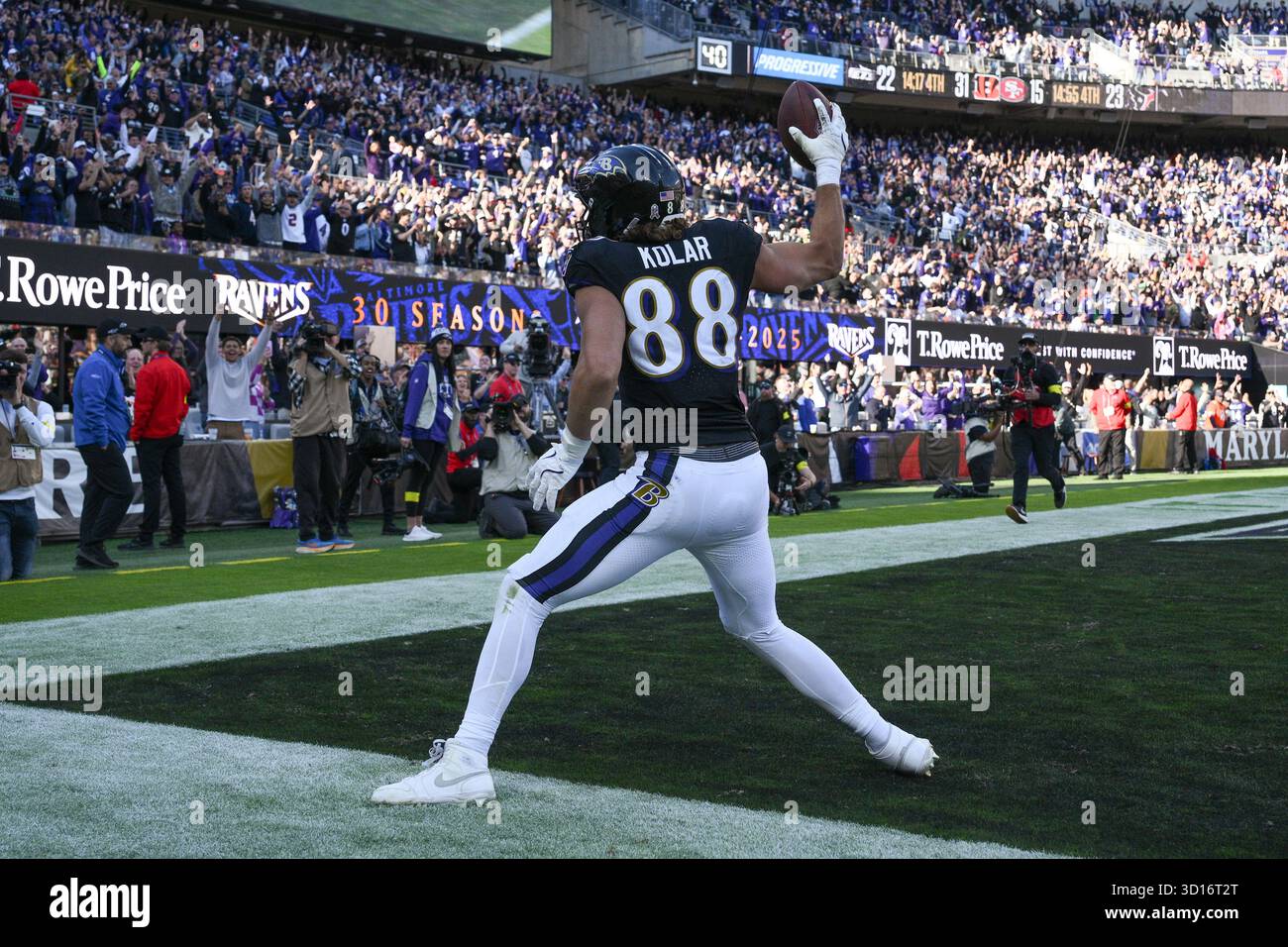 Baltimore Ravens tight end Charlie Kolar (88) spikes the ball after ...