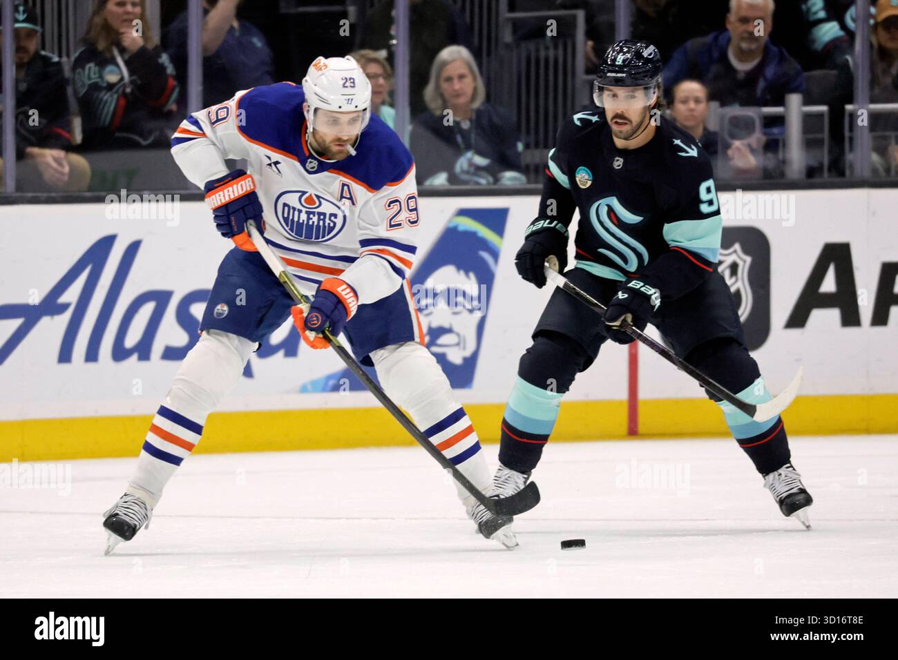 Edmonton Oilers center Leon Draisaitl (29) controls the puck with ...