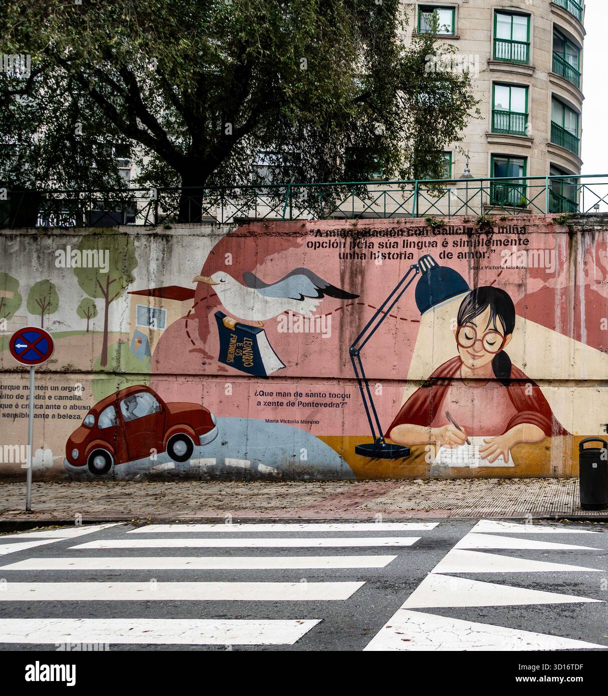 Colorful mural in Pontevedra, Spain, featuring a girl writing, a car ...