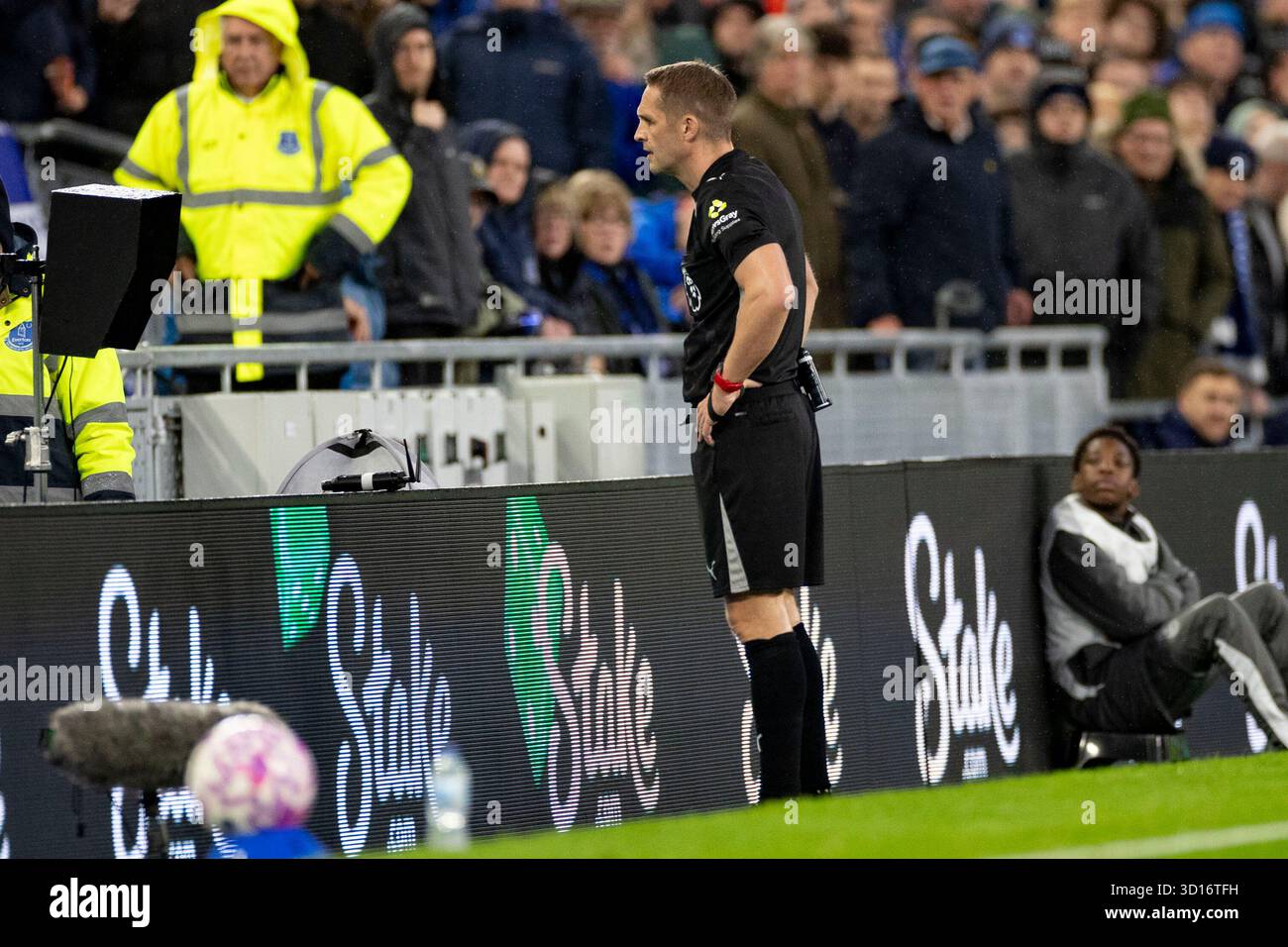 Referee Craig Pawson consults VAR for a possible off-side during the ...