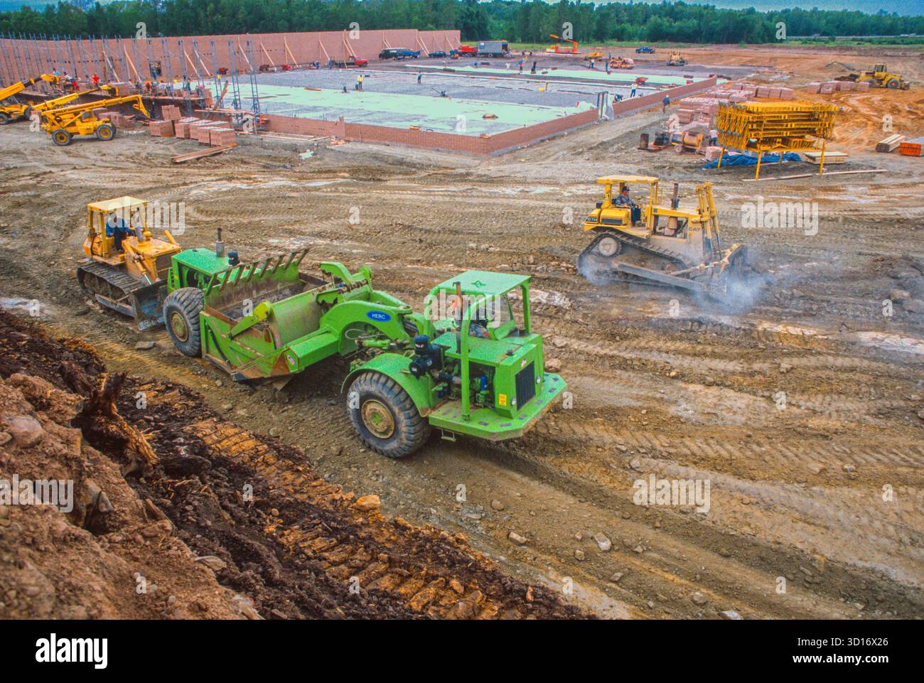 Construction Site Preparation. CAT D7 Bulldozer Pushing an Earthmover ...
