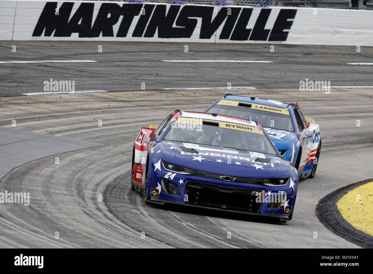 William Byron (24) leads Kyle Larson (5) during a NASCAR Cup series ...