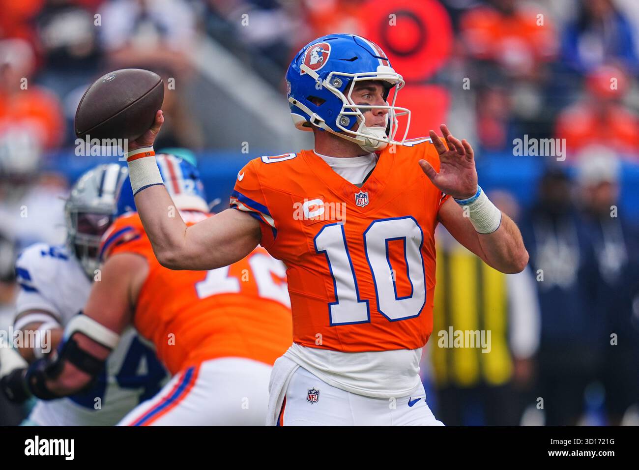 Denver Broncos quarterback Bo Nix throws a pass in the first half of an ...