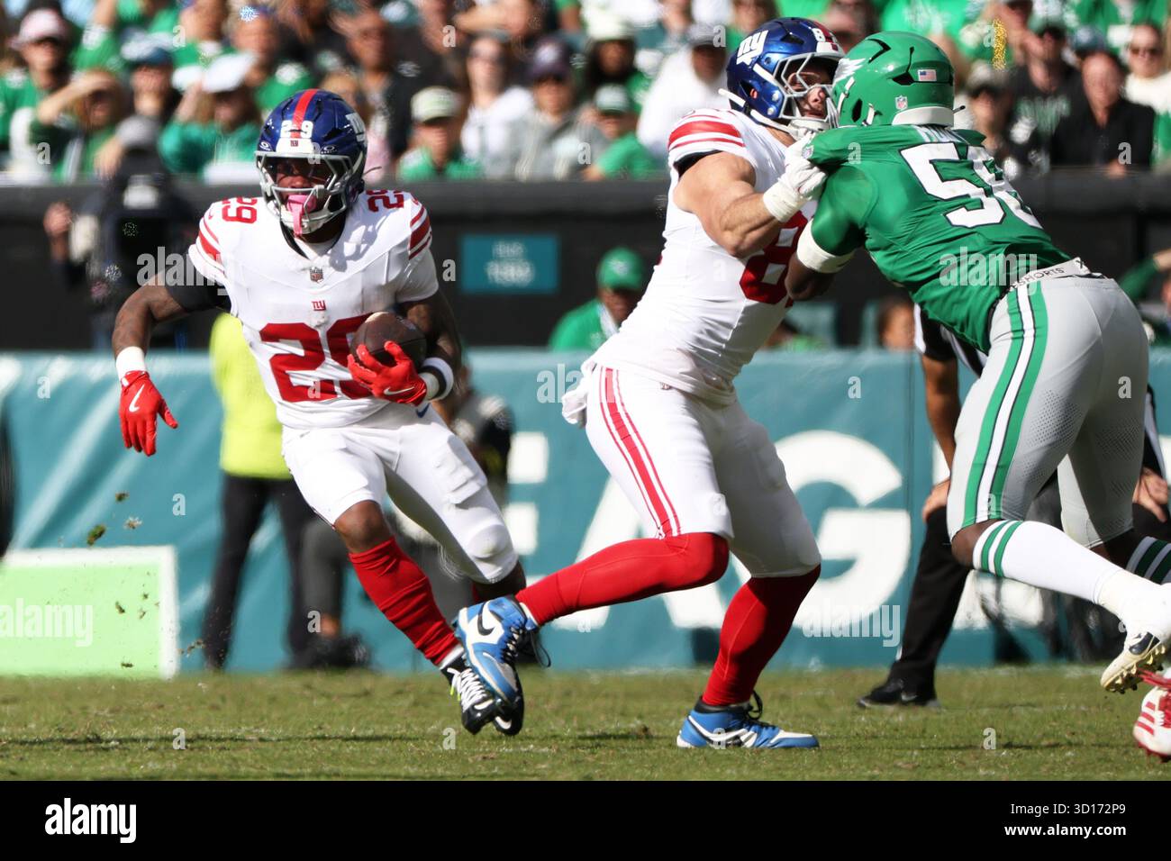 New York Giants running back Tyrone Tracy Jr. (29) runs with the ball ...