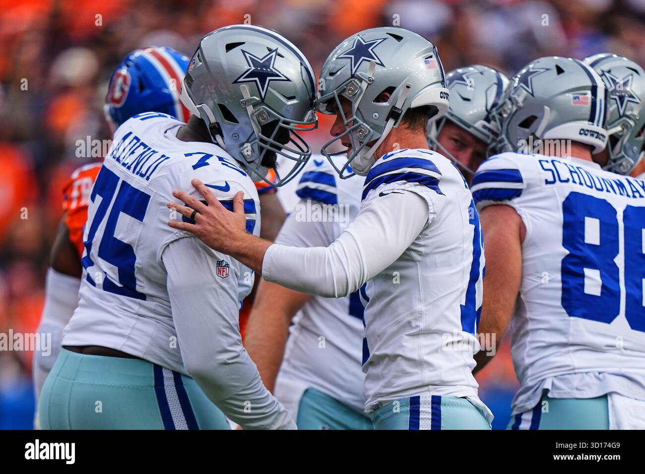 Dallas Cowboys' Hakeem Adeniji (75) and place kicker Brandon Aubrey ...