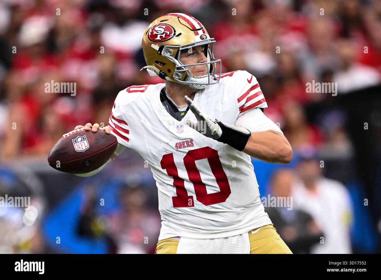 San Francisco 49ers quarterback Mac Jones (10) looks to pass the ball ...
