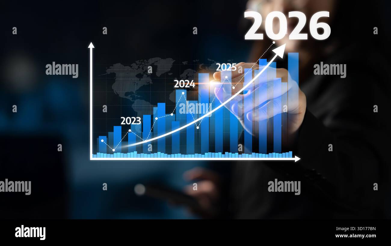 A business professional illustrates a growth projection chart for 2026 ...