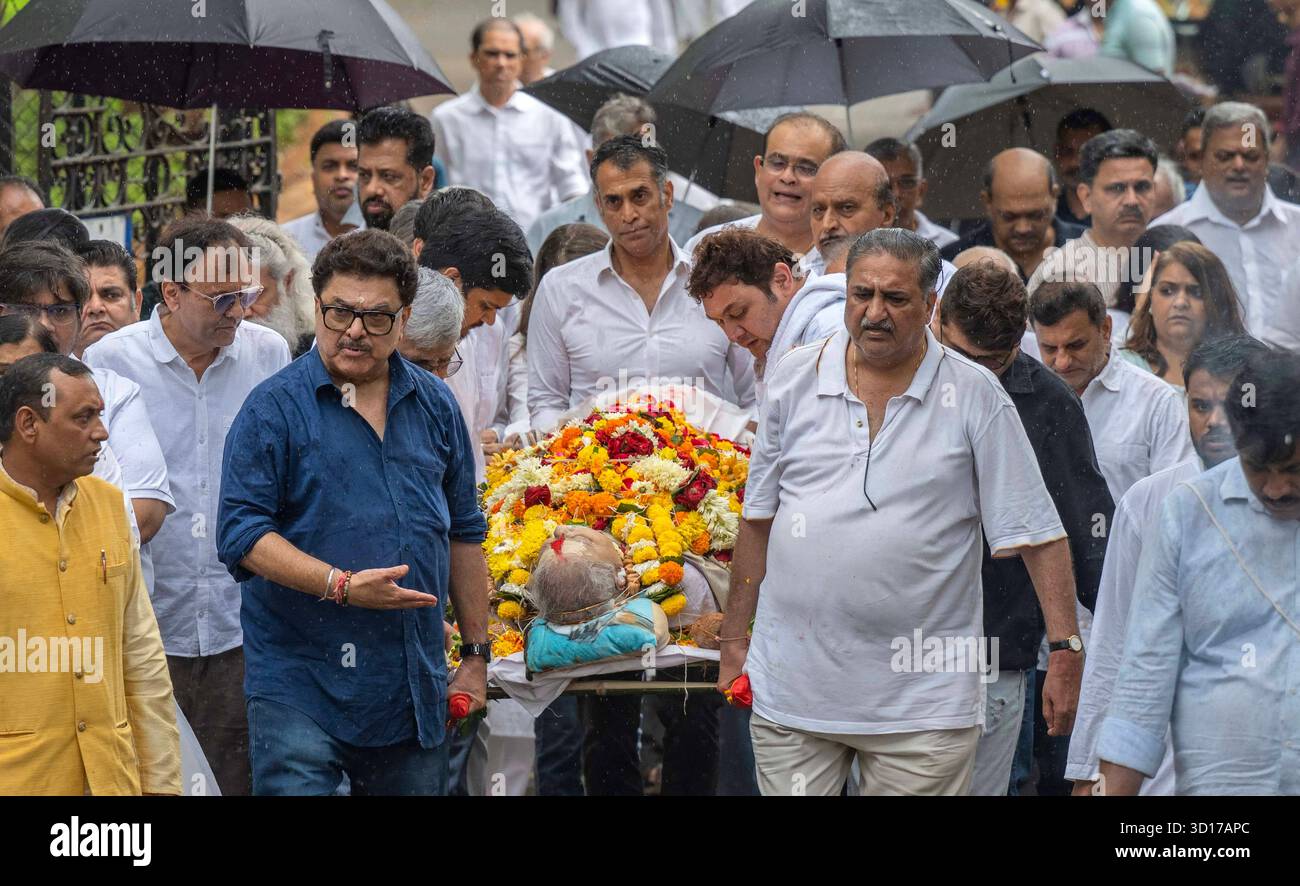 MUMBAI, INDIA - OCTOBER 26: Relatives and friends mourn during the last ...