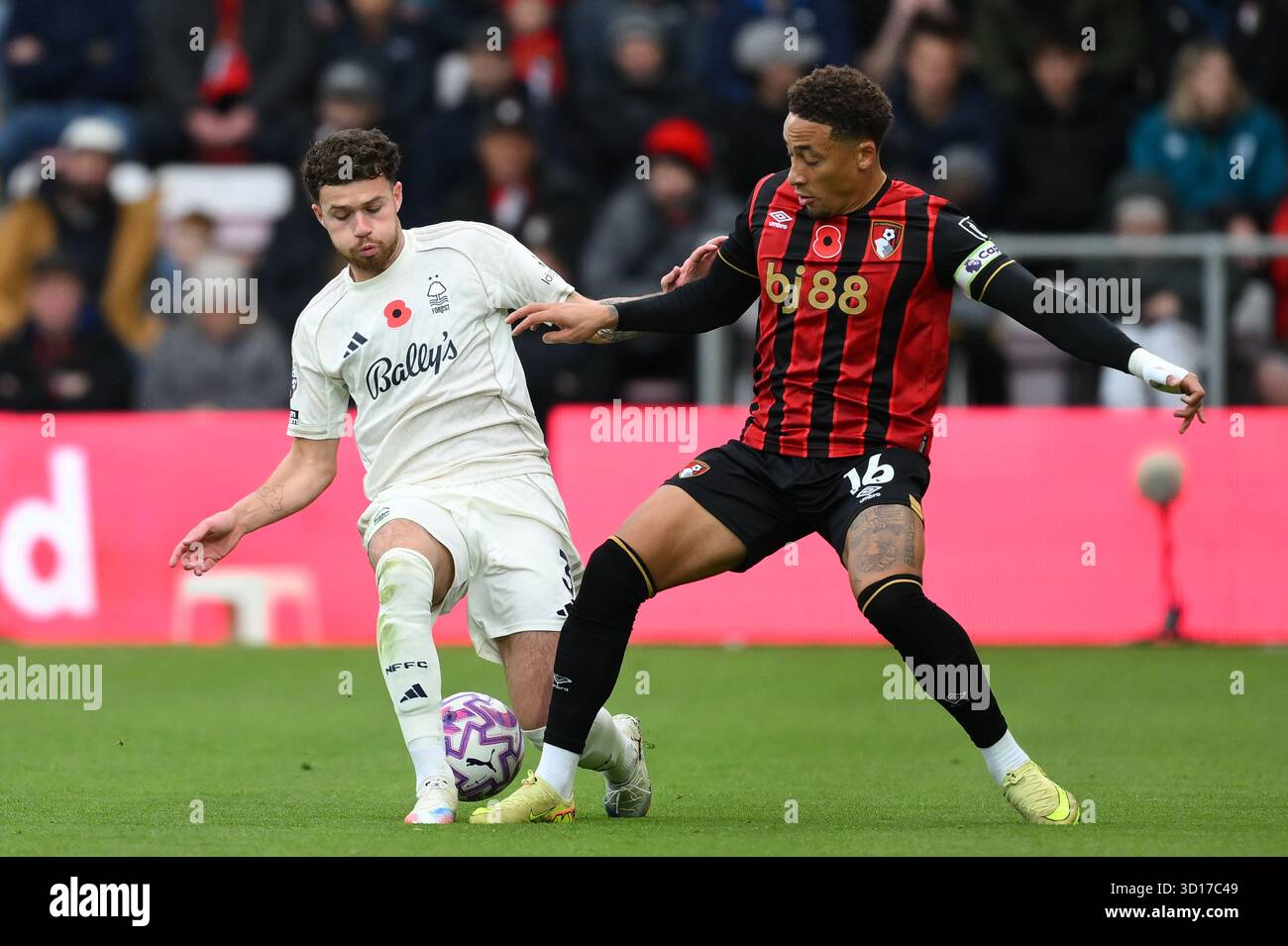 Marcus Tavernier of Bournemouth battles with Neco Williams of ...