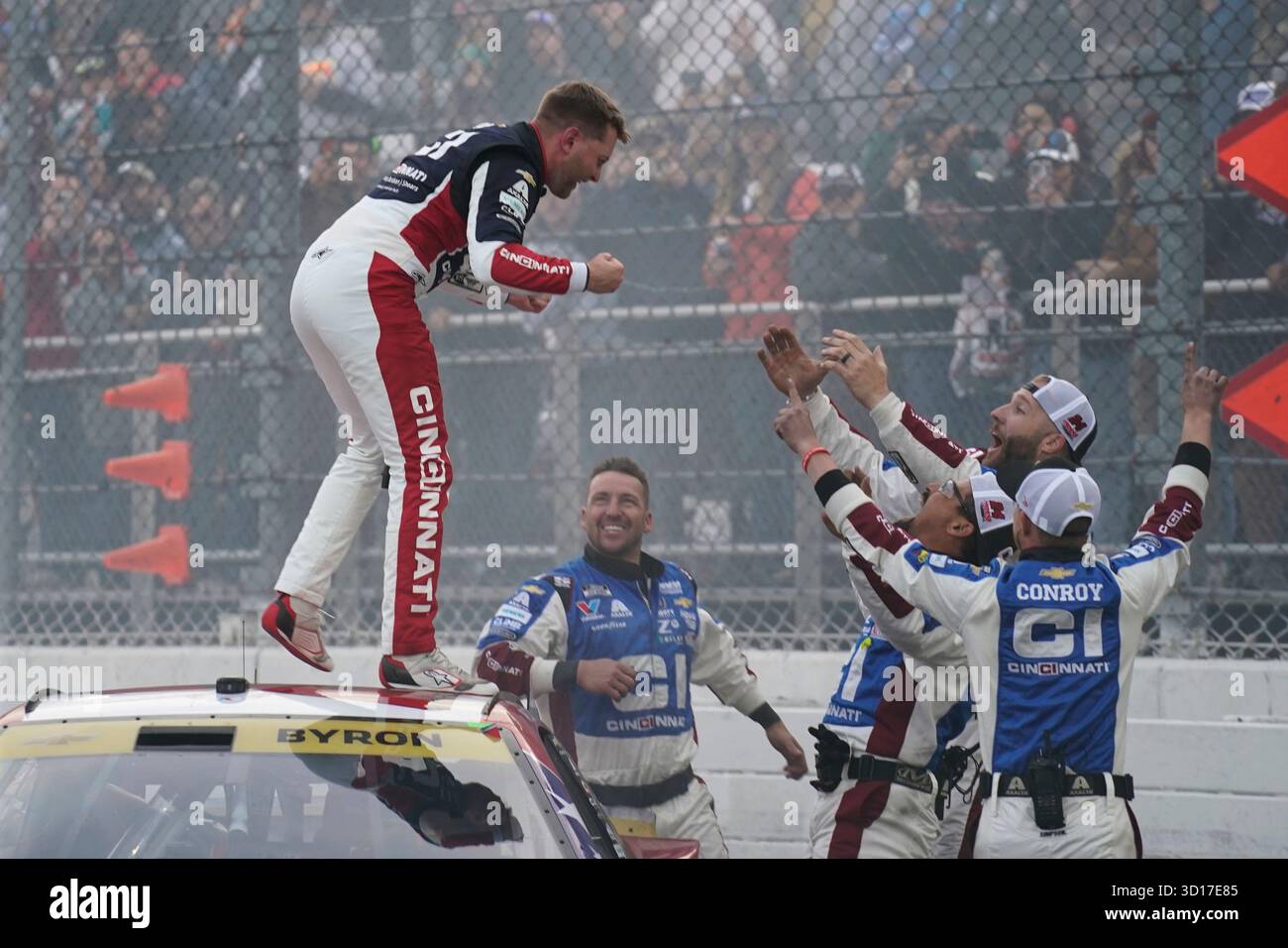 William Byron, left, celebrates with his crew after winning a NASCAR ...