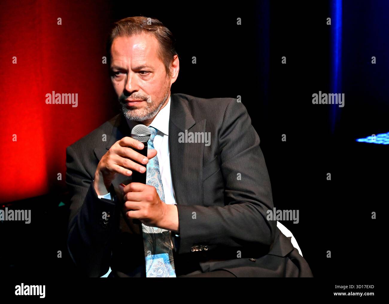 Danny Quinn is interviewed before receiving the award Stock Photo - Alamy