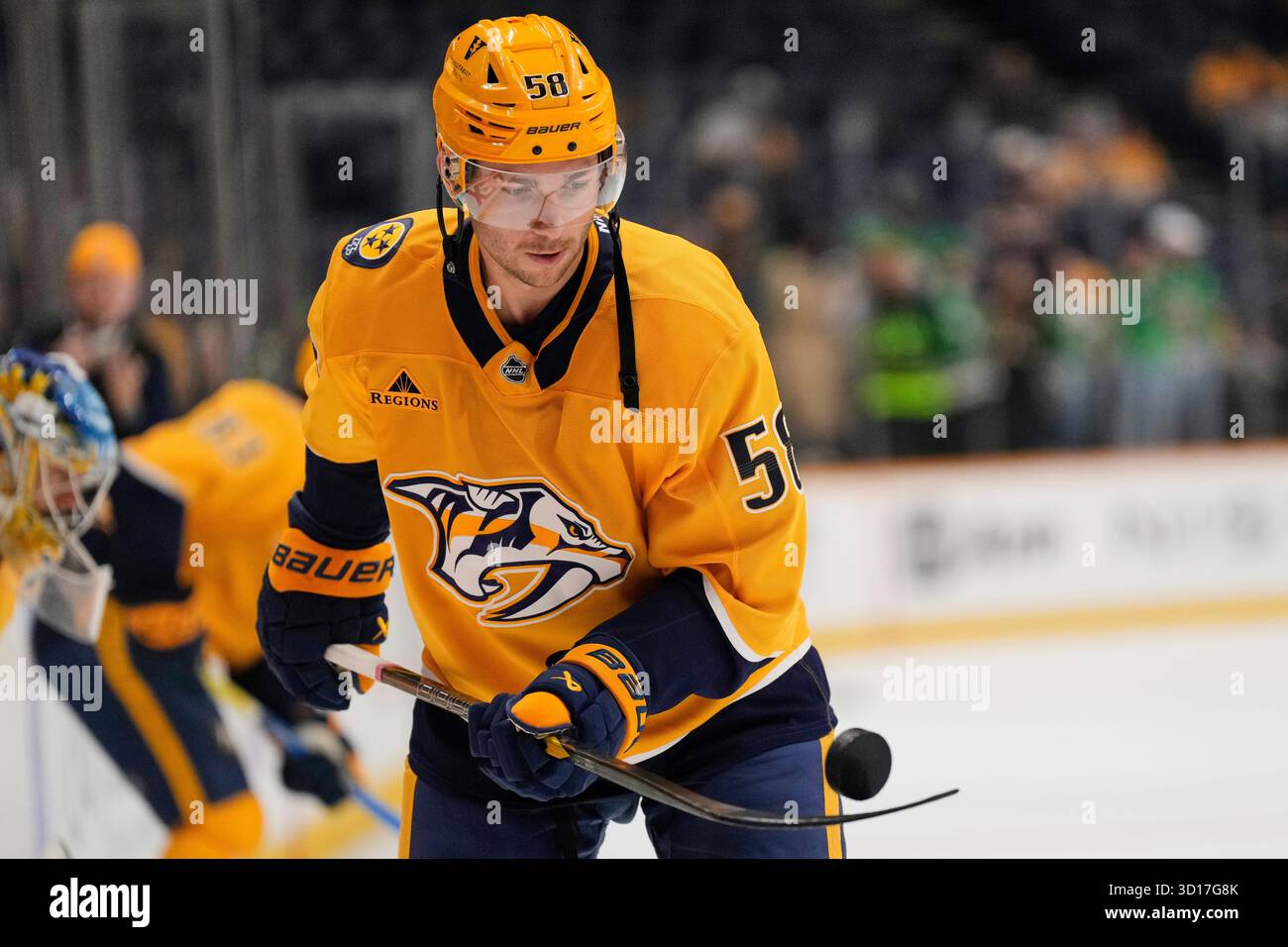 Nashville Predators left wing Michael Bunting (58) warms up before an ...