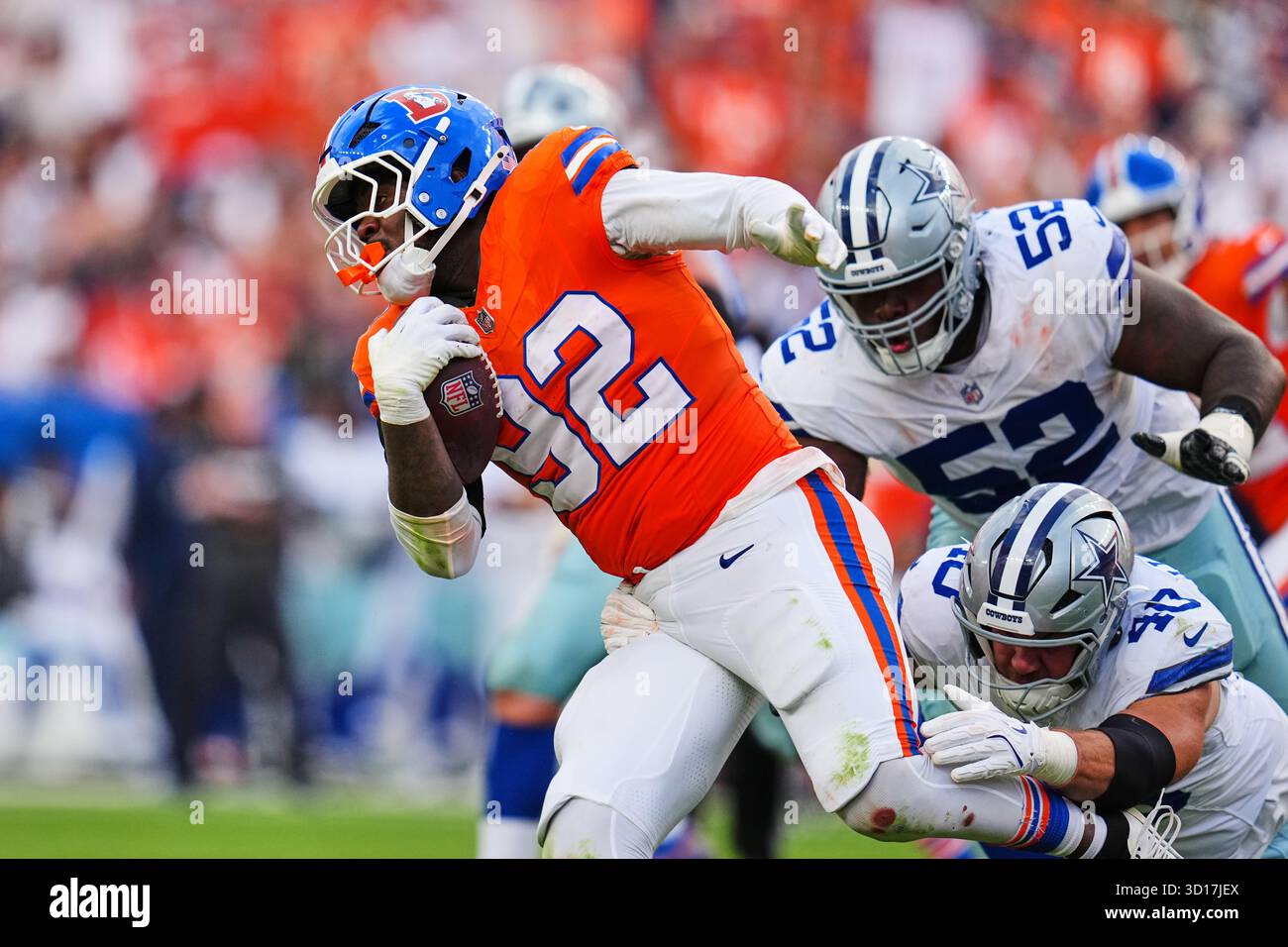 Denver Broncos linebacker Dondrea Tillman (92) returns an interception ...