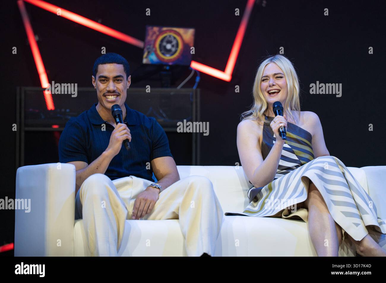 Dimitrius Schuster-Koloamatangi and Elle Fanning attend the MCM Comic ...