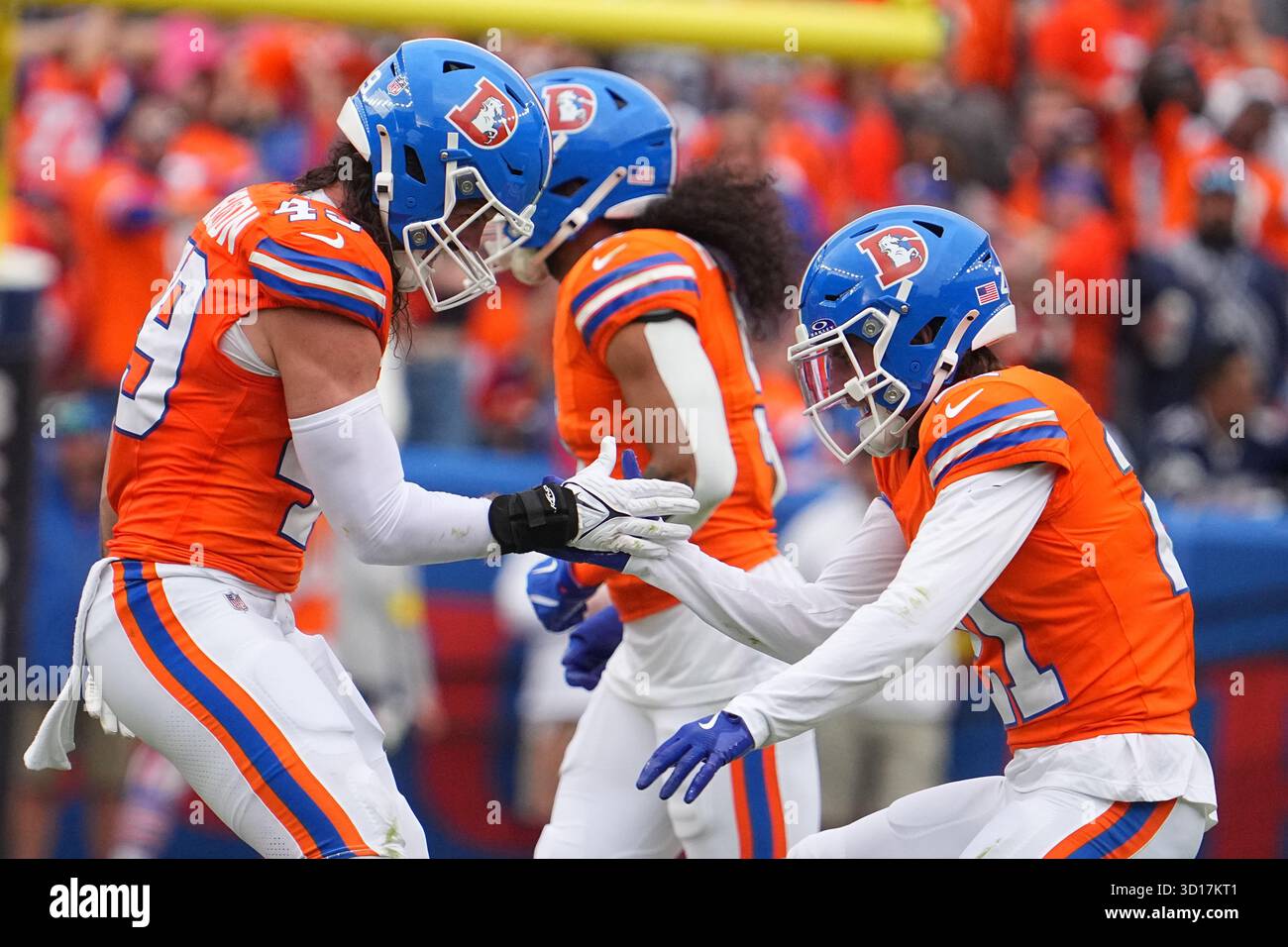 Denver Broncos linebacker Alex Singleton (49) and Denver Broncos ...