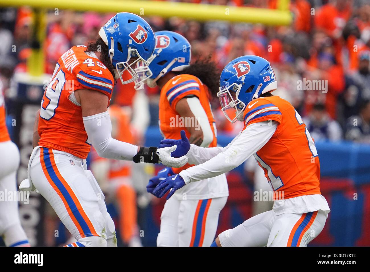 Denver Broncos linebacker Alex Singleton (49) and Denver Broncos ...