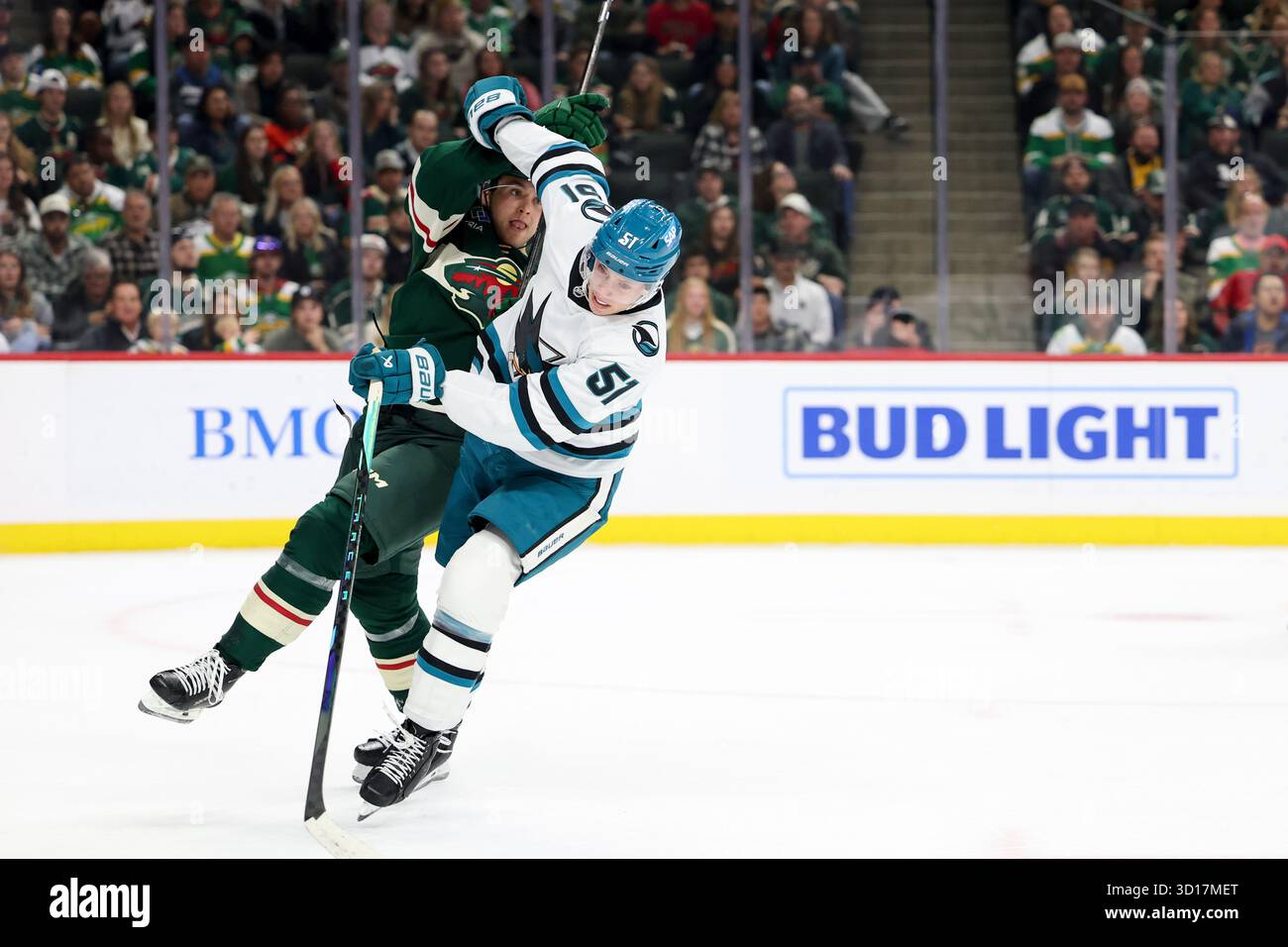 Minnesota Wild defenseman Brock Faber, left, collides with San Jose ...