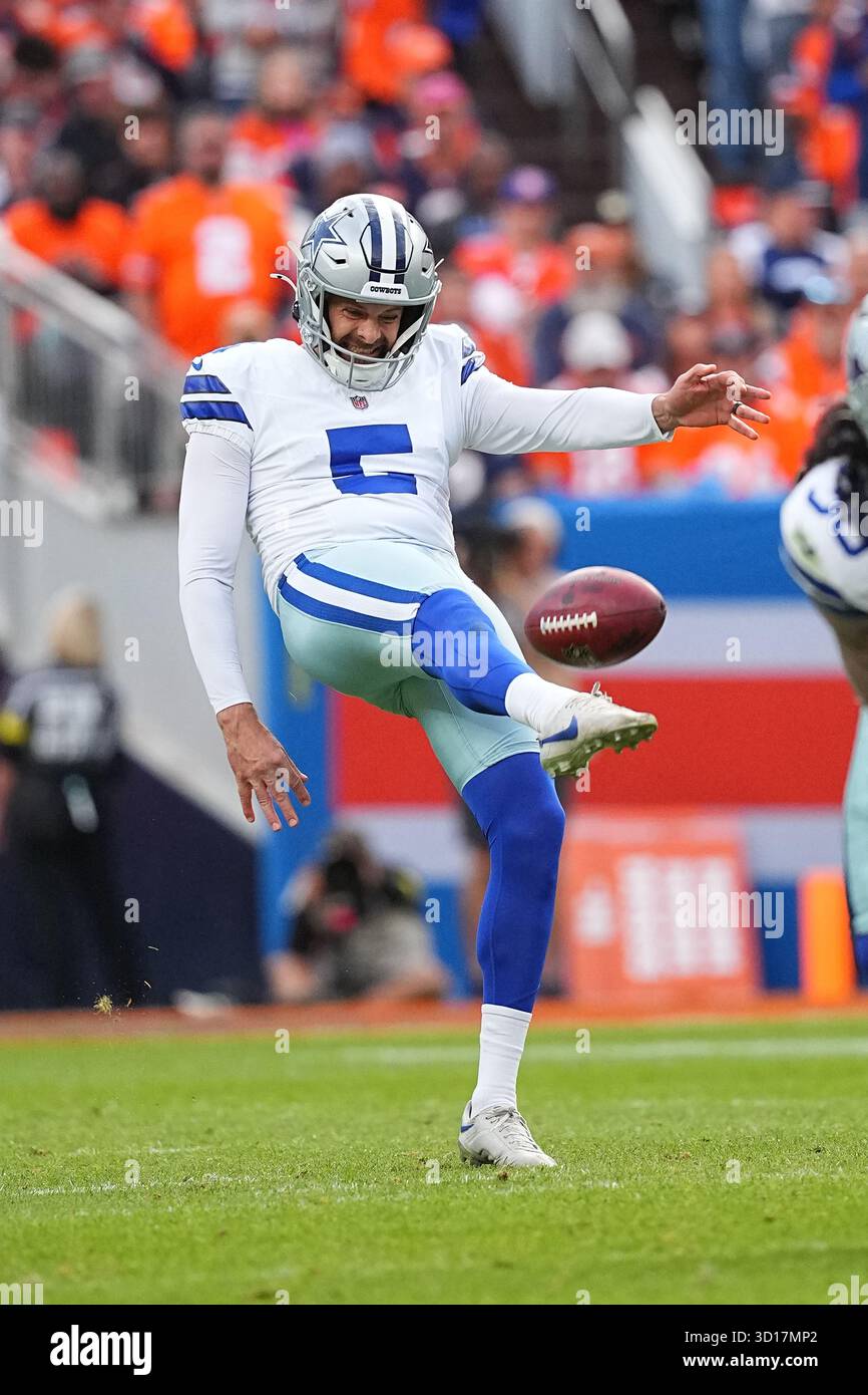 Dallas Cowboys punter Bryan Anger (5) kicks the ball against the Denver ...