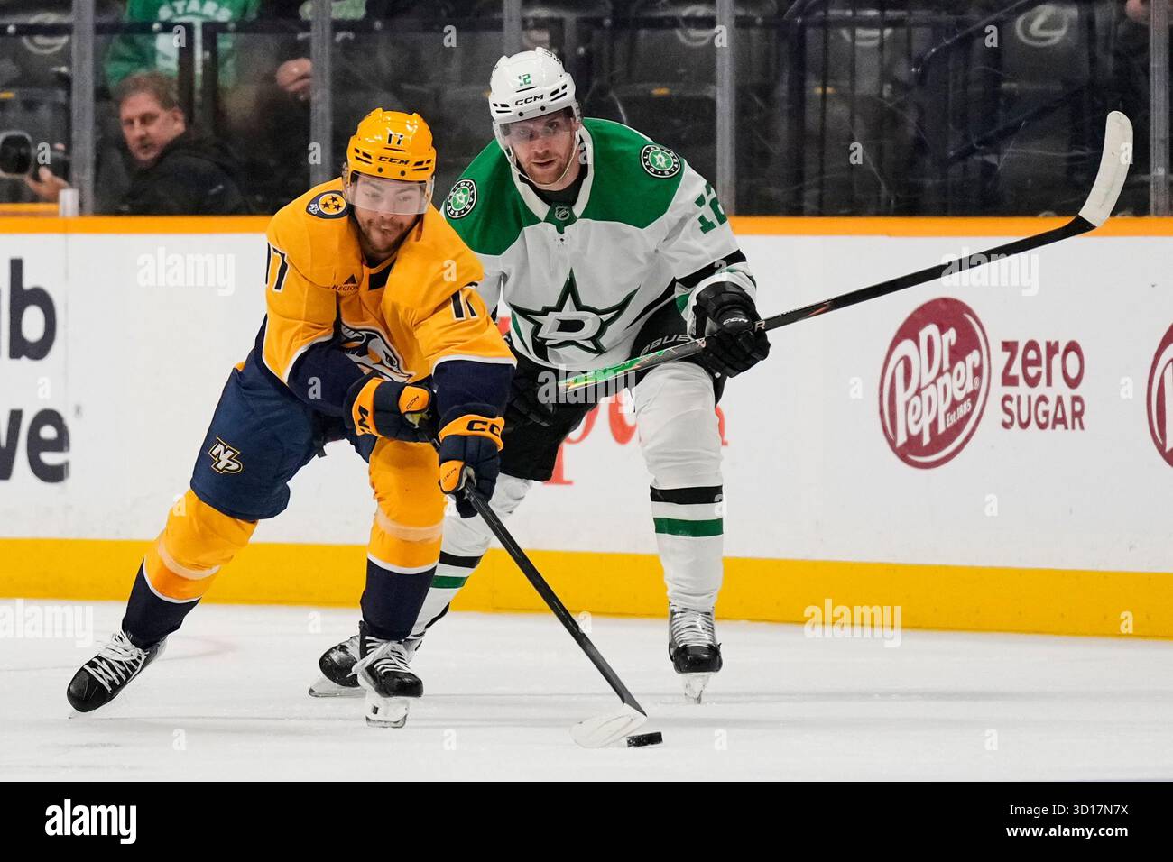 Nashville Predators center Tyson Jost (17) chases the puck past Dallas ...