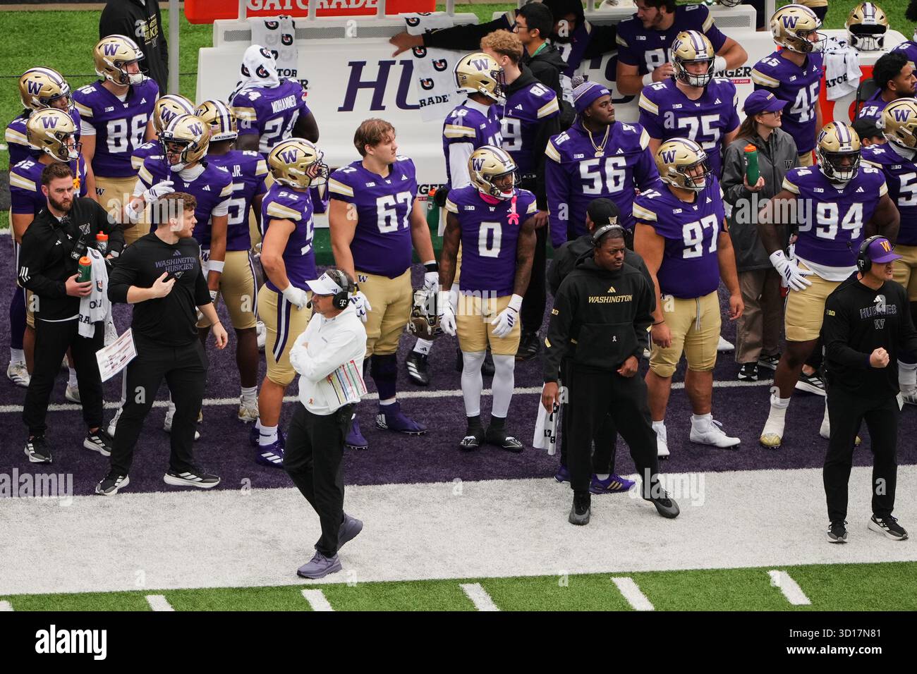 Washington head coach Jedd Fisch walks on the sideline during an NCAA ...