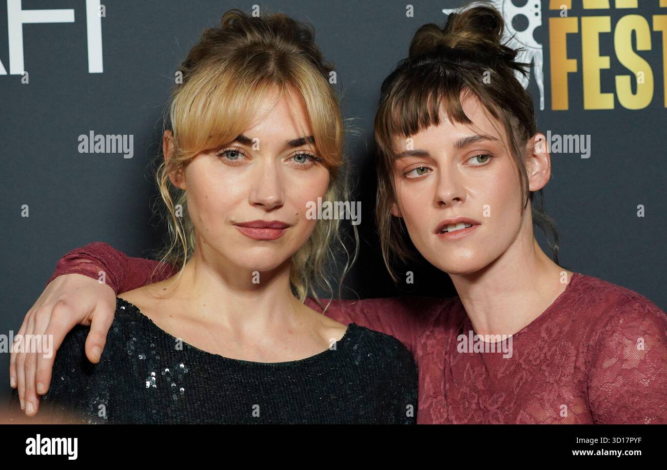 Imogen Poots, left, and Kristen Stewart arrive at an AFI Fest screening ...