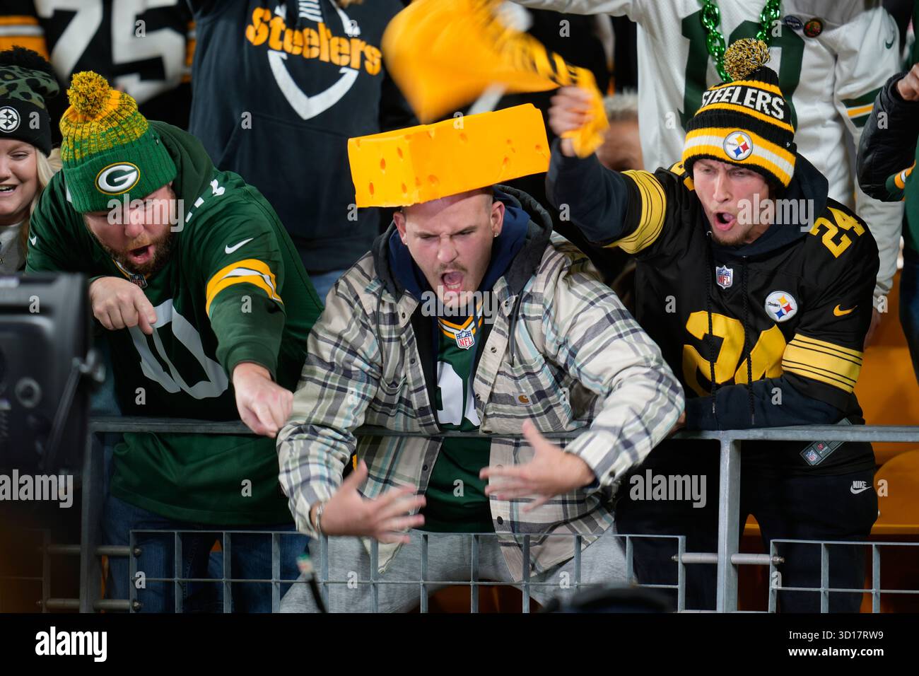 Fans cheer during the first half of an NFL football game between the ...