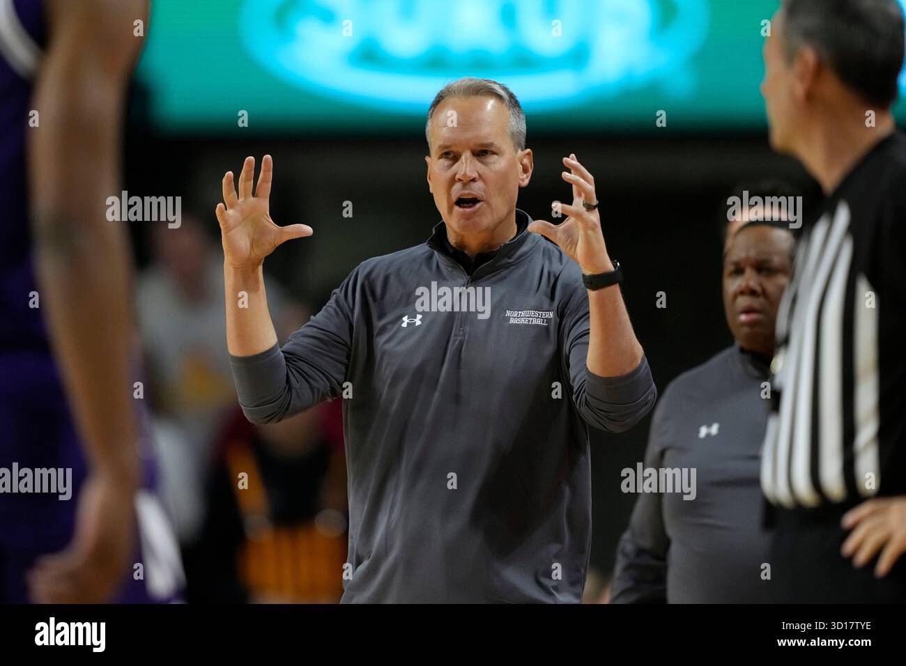 Northwestern head coach Chris Collins reacts to a call during the first ...