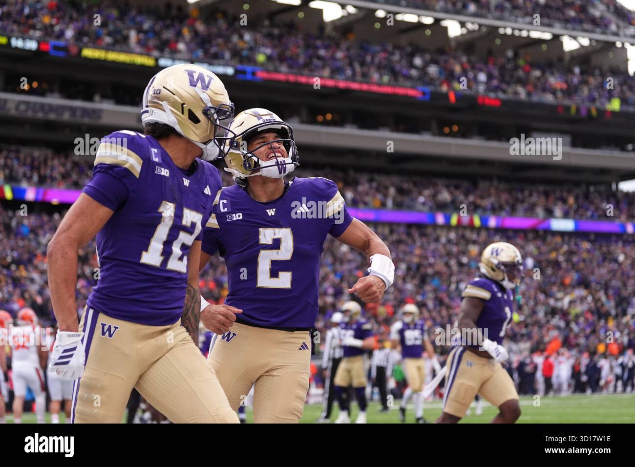 Washington quarterback Demond Williams Jr. (2) celebrates a touchdown ...