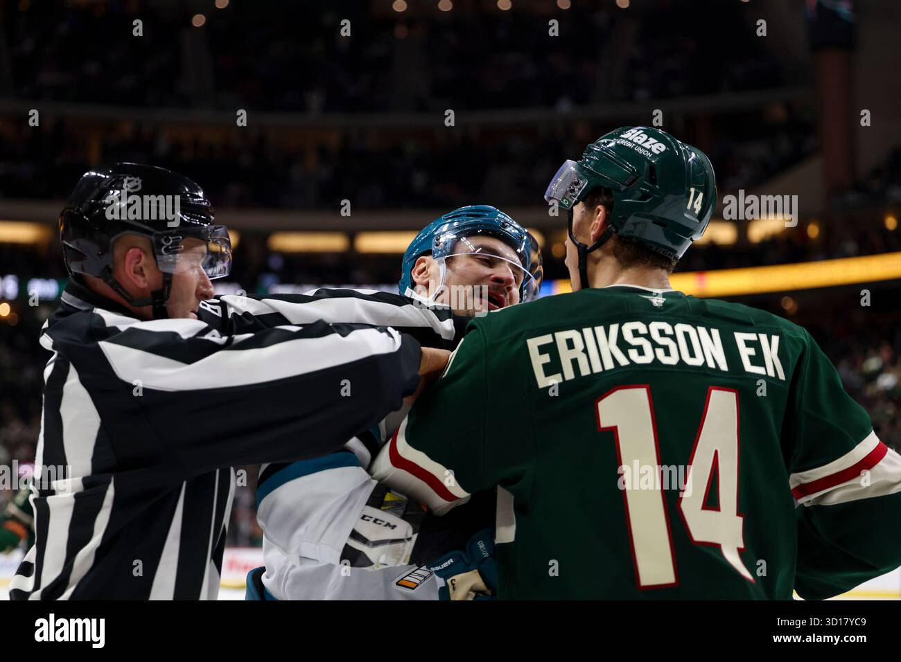 Minnesota Wild center Joel Eriksson Ek (14) fights with San Jose Sharks ...