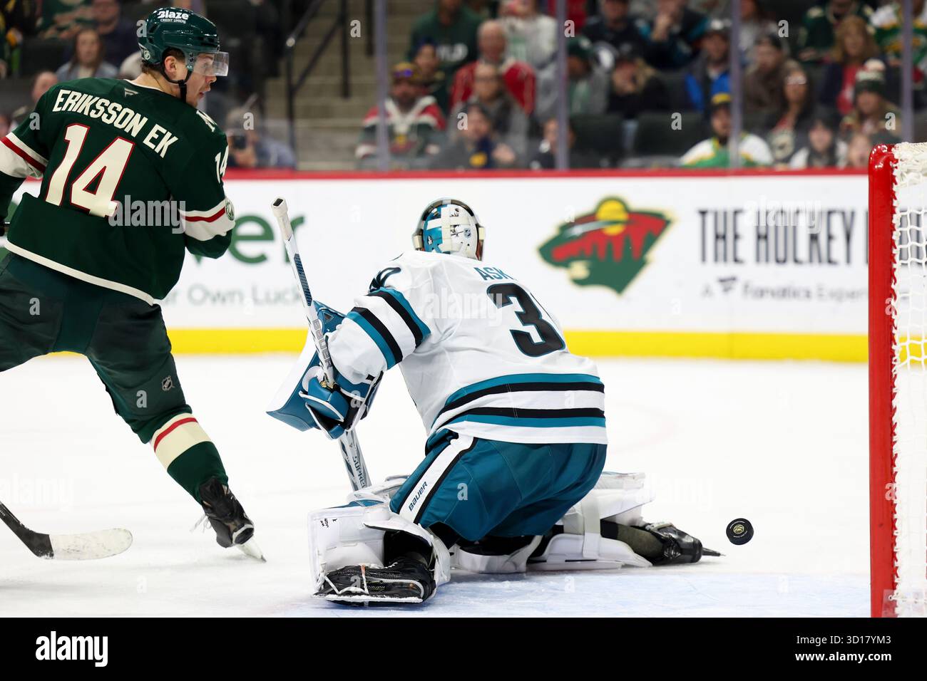 Minnesota Wild center Joel Eriksson Ek (14) scores against San Jose ...