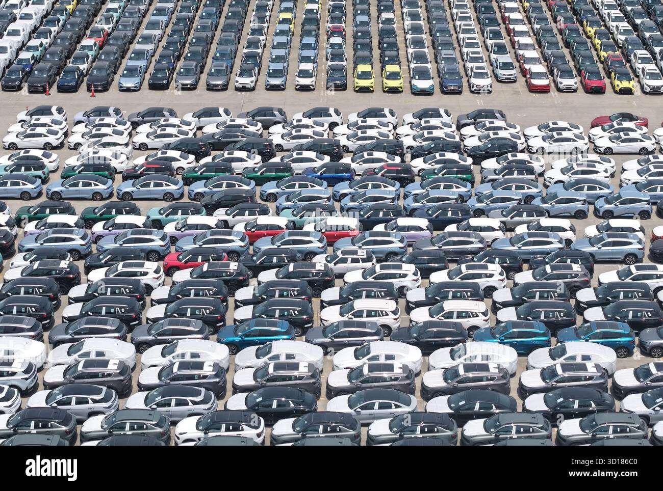 Aerial view of new vehicles waiting for shipment to overseas markets in ...