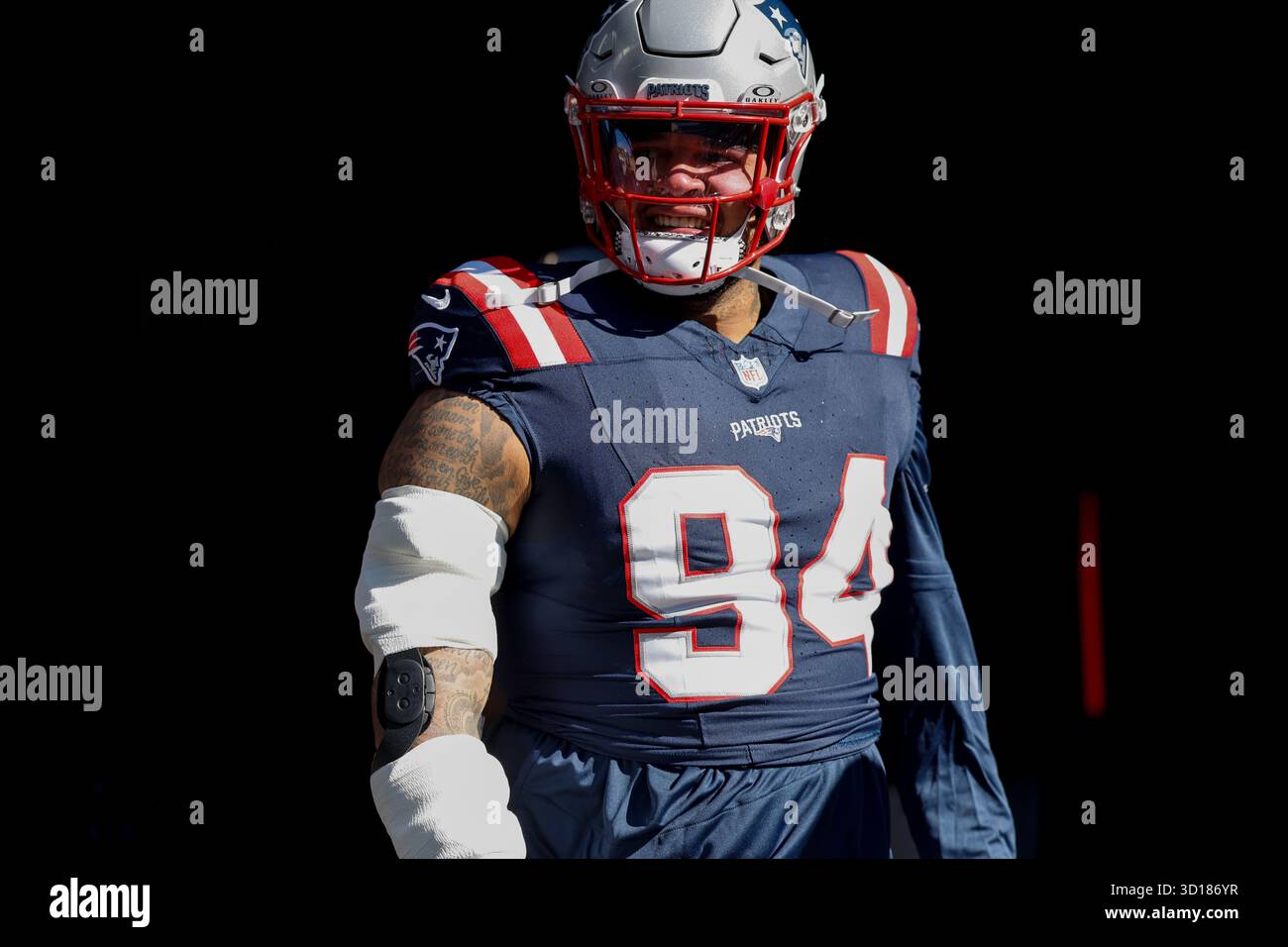 New England Patriots defensive tackle Cory Durden (94) prepares to take ...