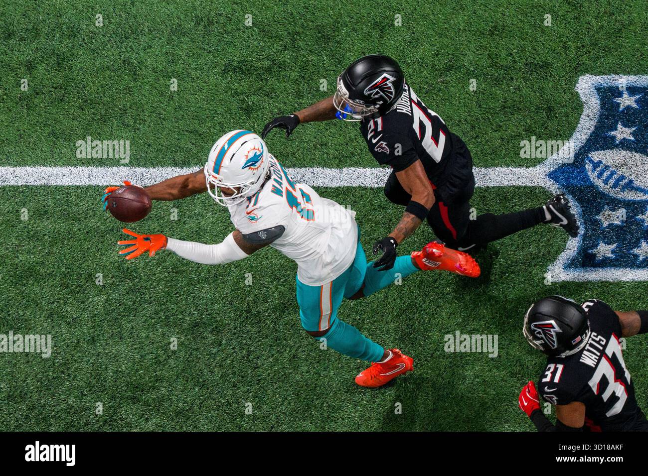 Miami Dolphins wide receiver Jaylen Waddle (17) attempts to catch a ...