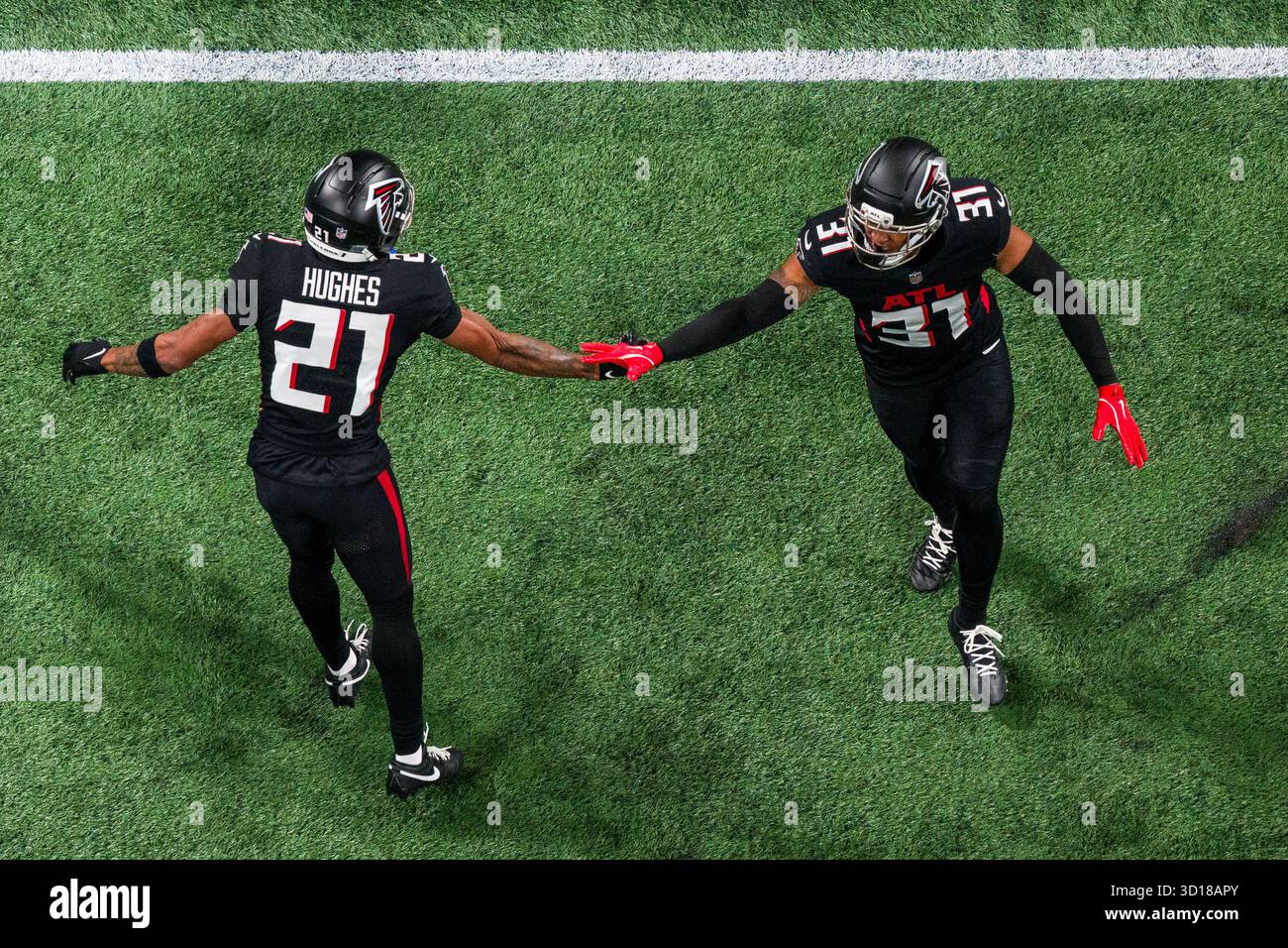 Atlanta Falcons cornerback Mike Hughes (21) celebrates with safety ...